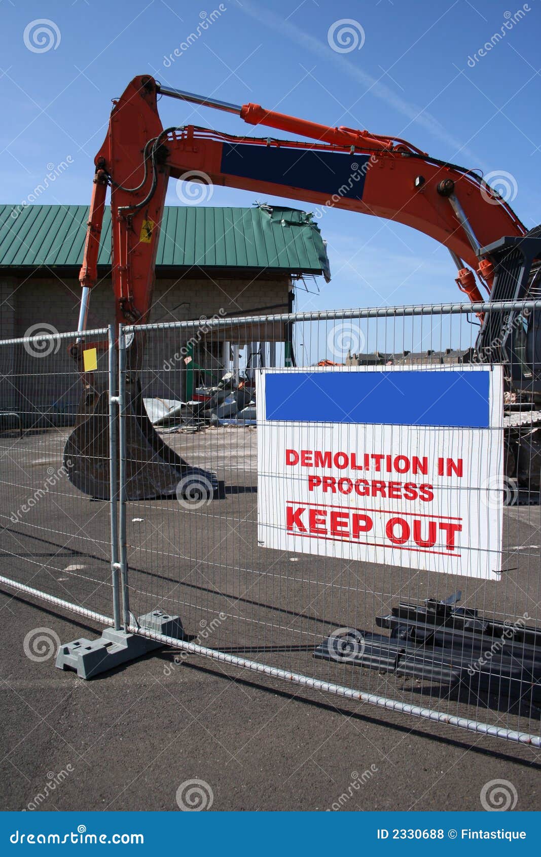 Demolition Site Top View. Heavy Excavator Loading A Debris And Rubble ...