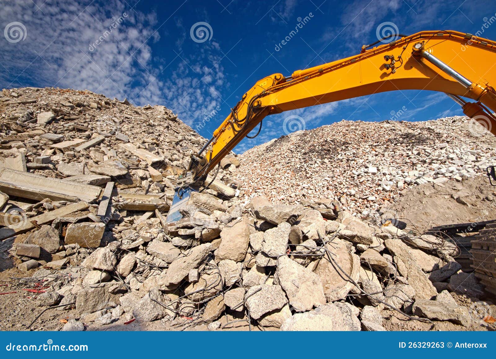 Construction Waste On The Background Of A Fence, Trees And Houses ...