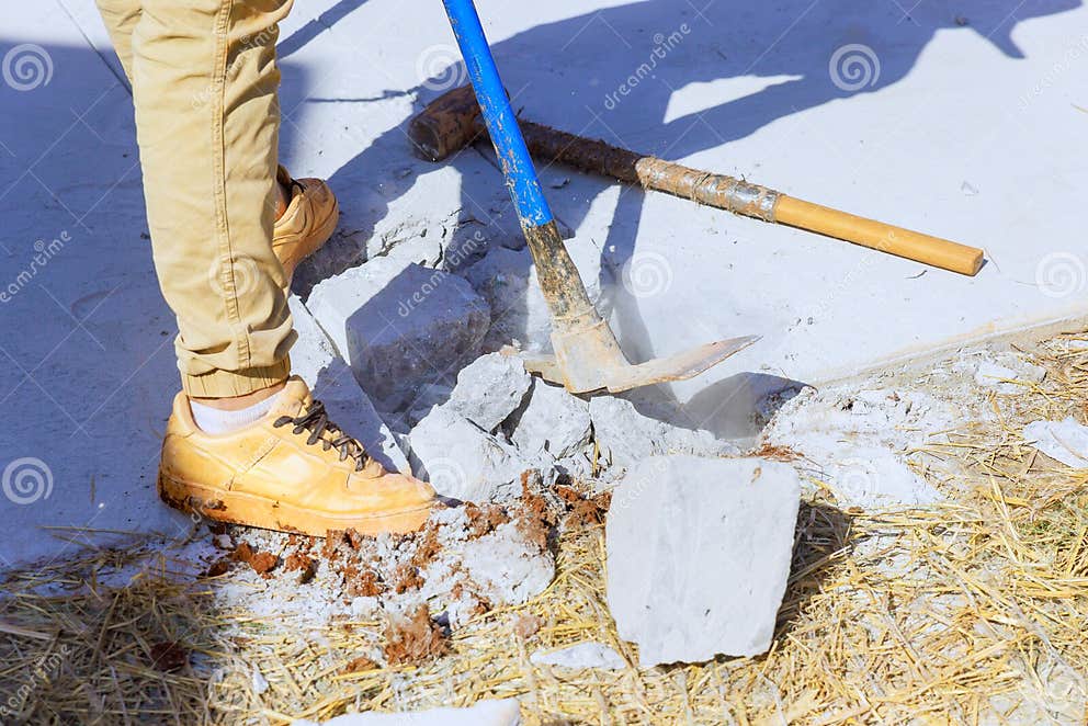 Demolition Worker Breaks Concrete Driveway Using Hammer on Site Stock ...