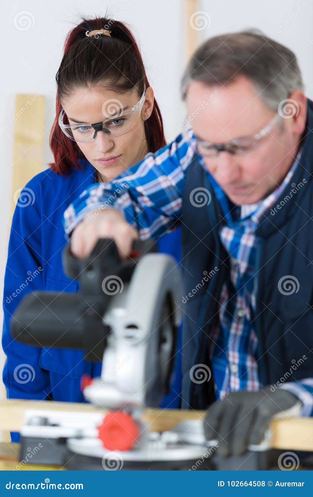 Demonstrating How To Use Drop Saw Stock Photo - Image of apprenticeship ...