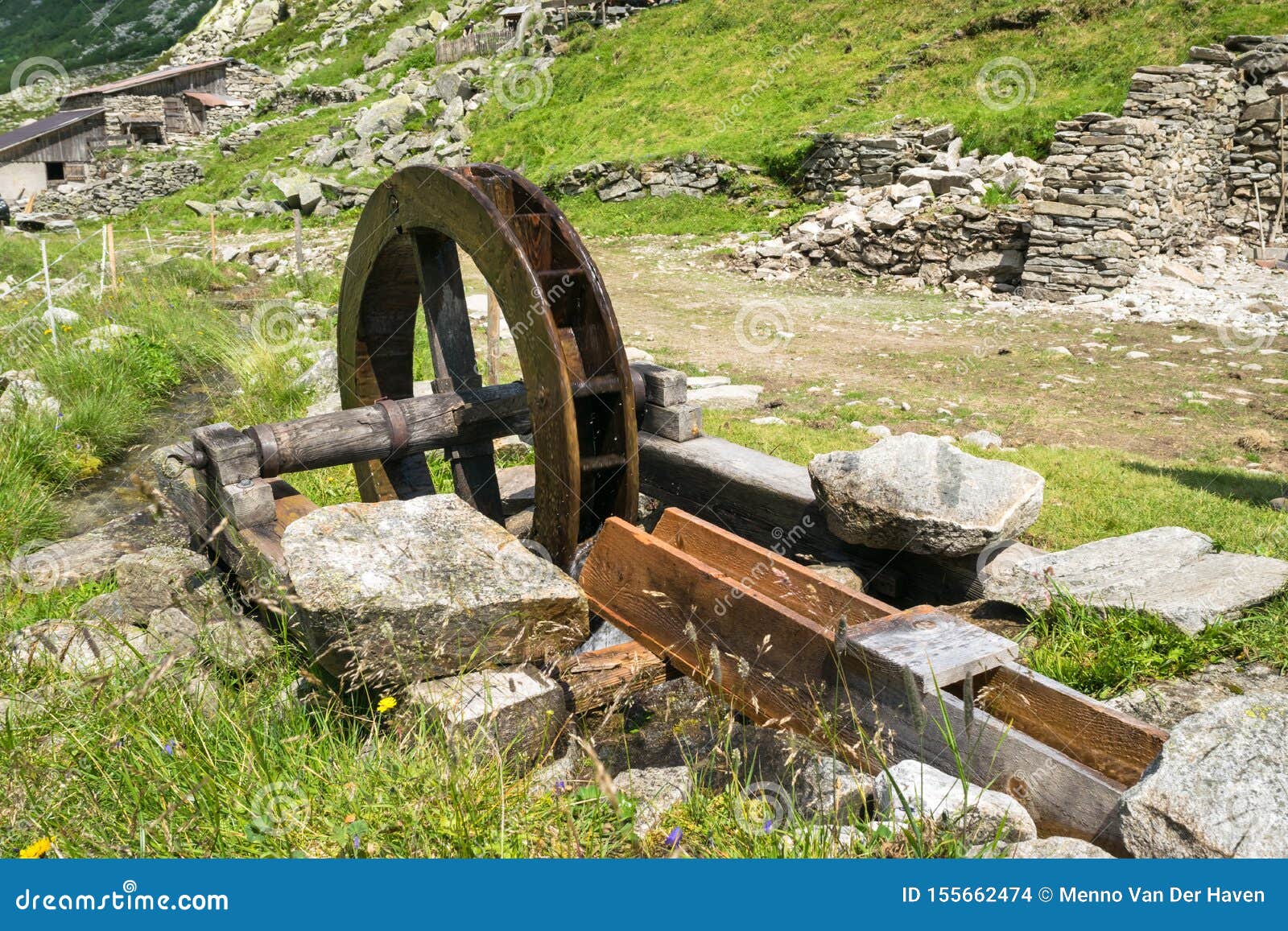 Spinning Water Wheel in the Mountains of Tirol, Austria Stock Photo ...