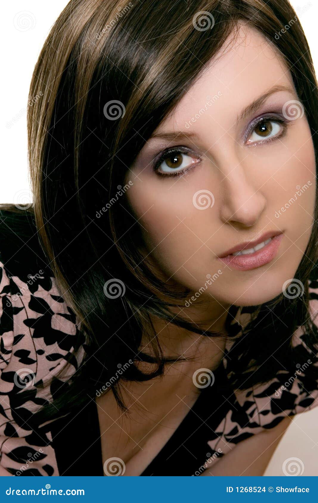 Demure brunette looking up stock photo. Image of fashion - 1268524