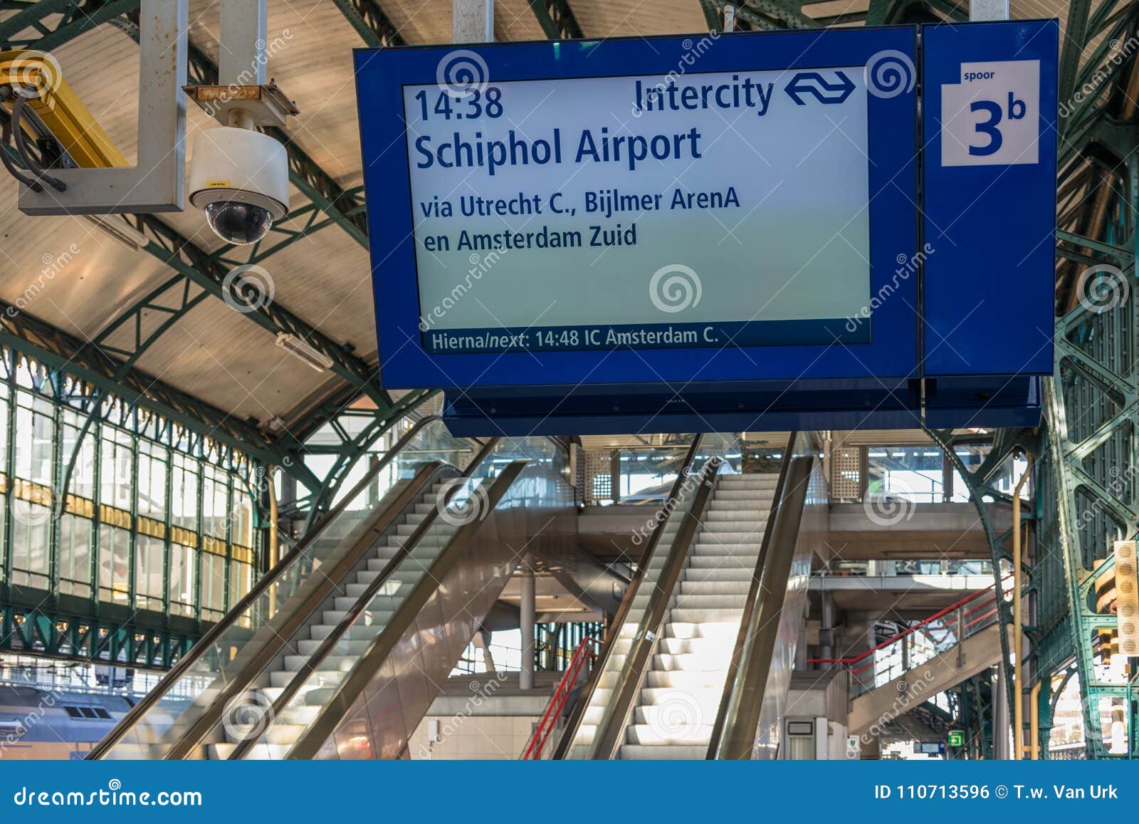 Railway Station Concourse with Information Panel and Exit Sign ...