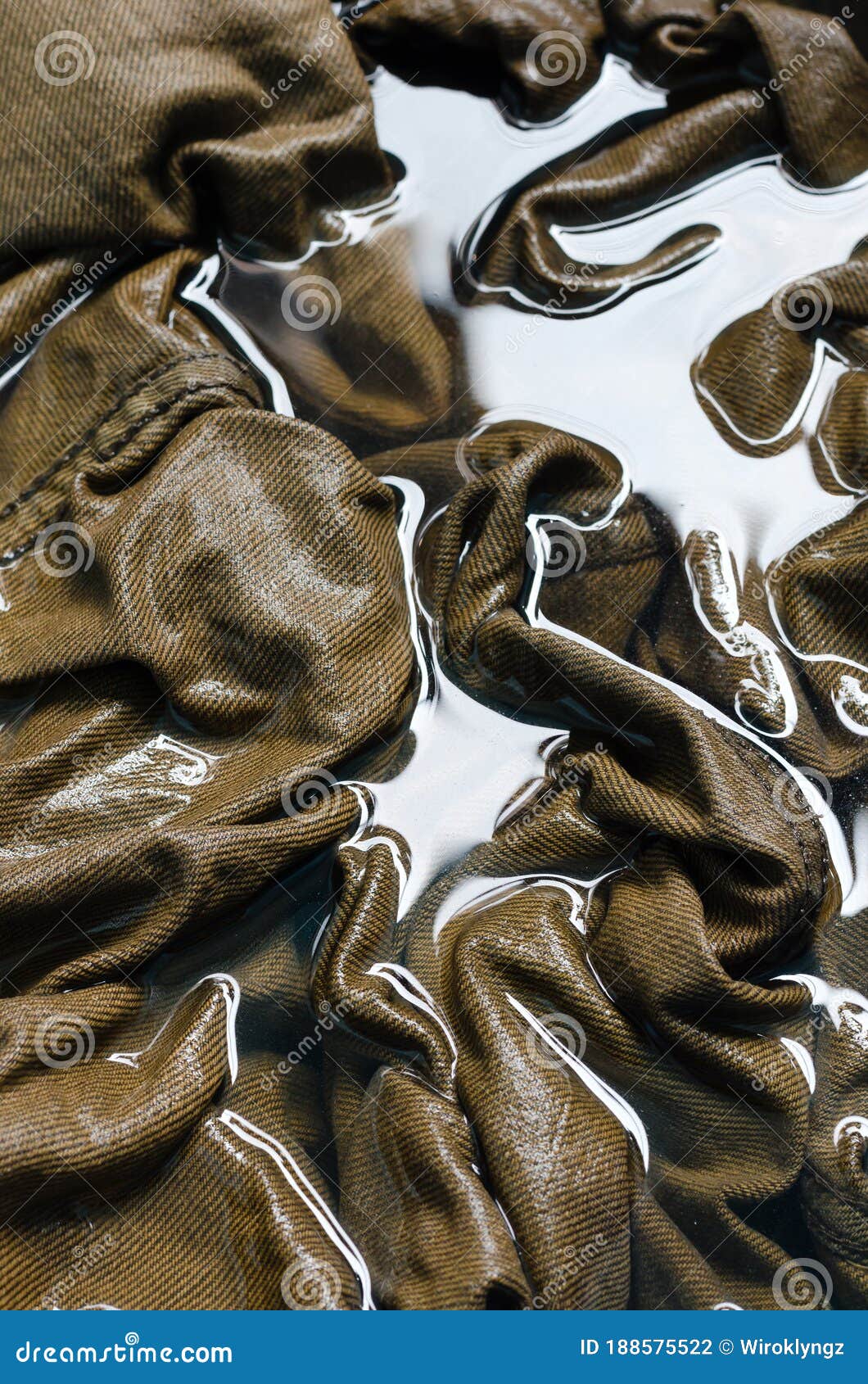 Brown Denim Fabric in Water To Washing for Abstract Background. Stock ...