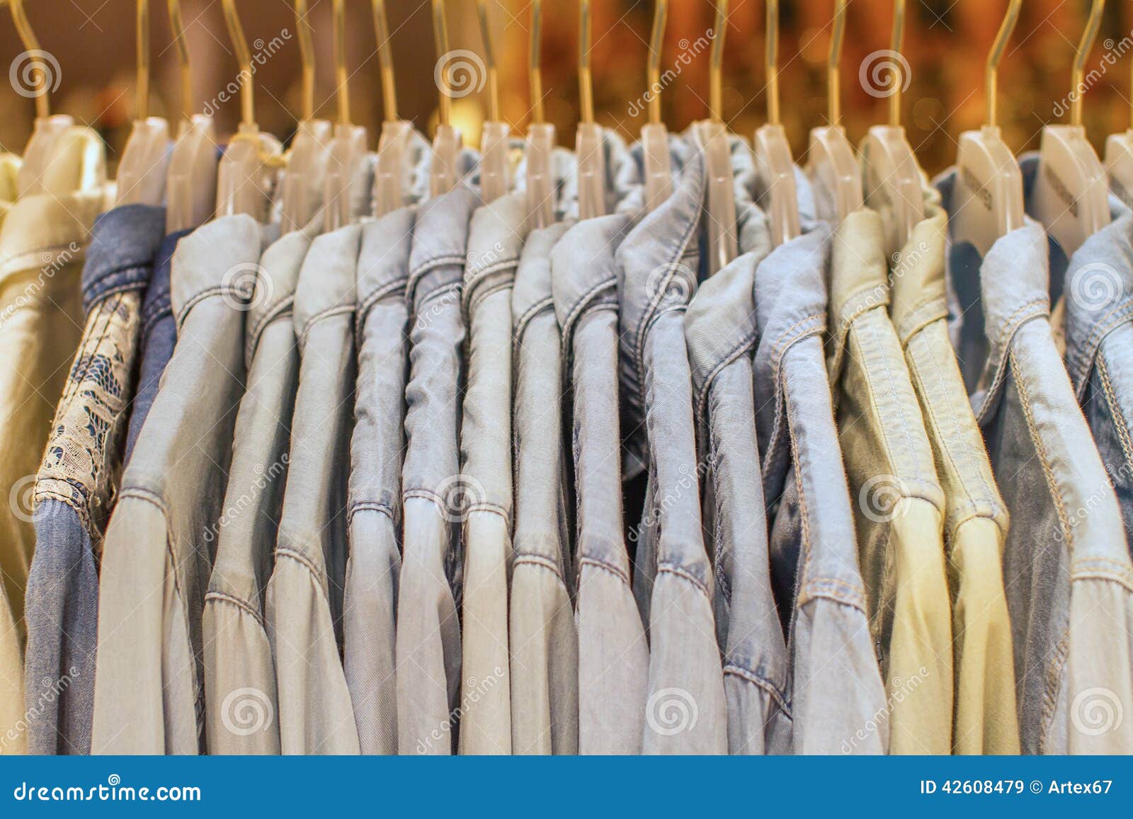 Denim Shirt Hanging on a Hanger in the Store Stock Image - Image of ...