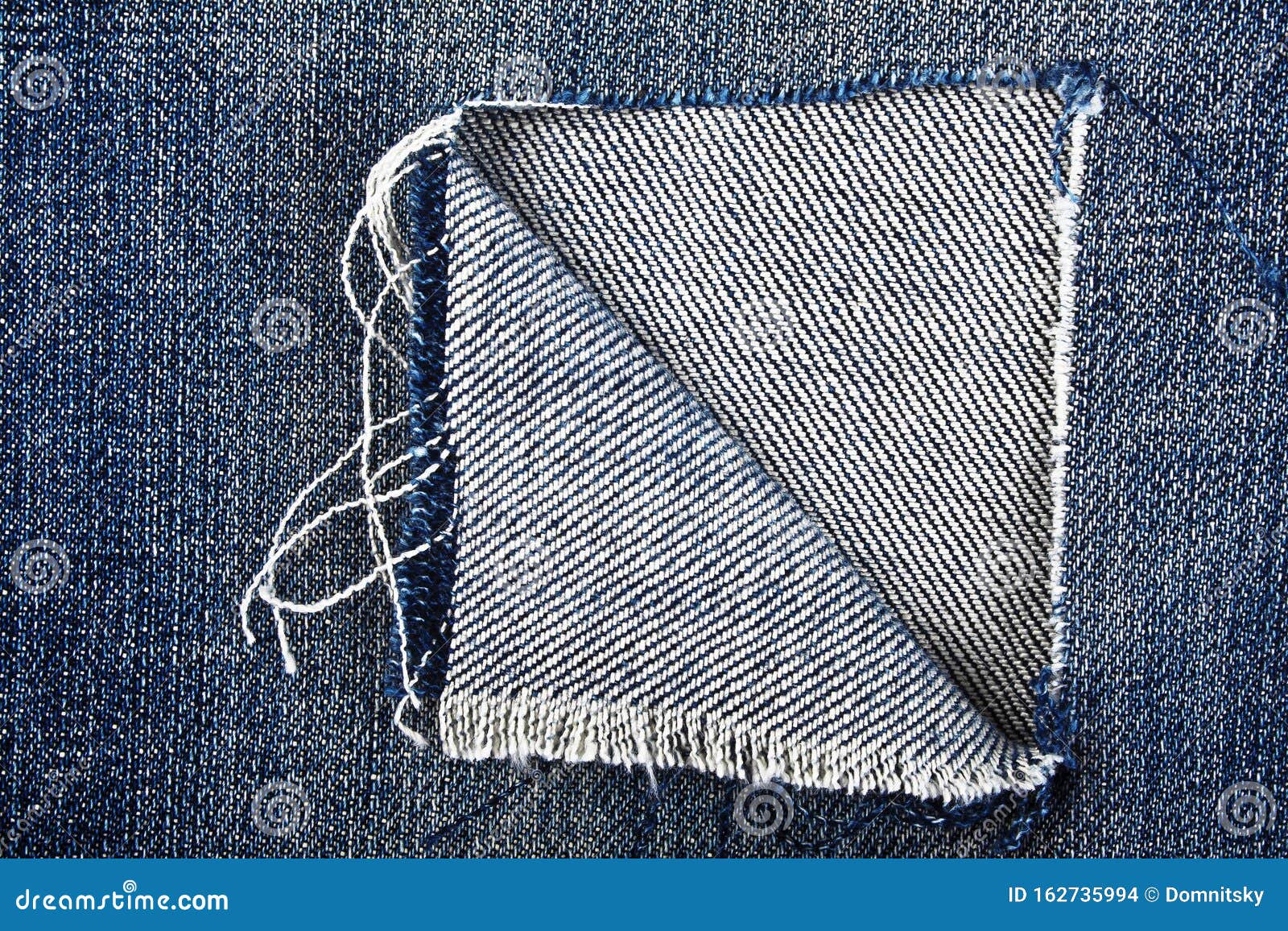 Denim texture, torn fabric stock photo. Image of design - 162735994