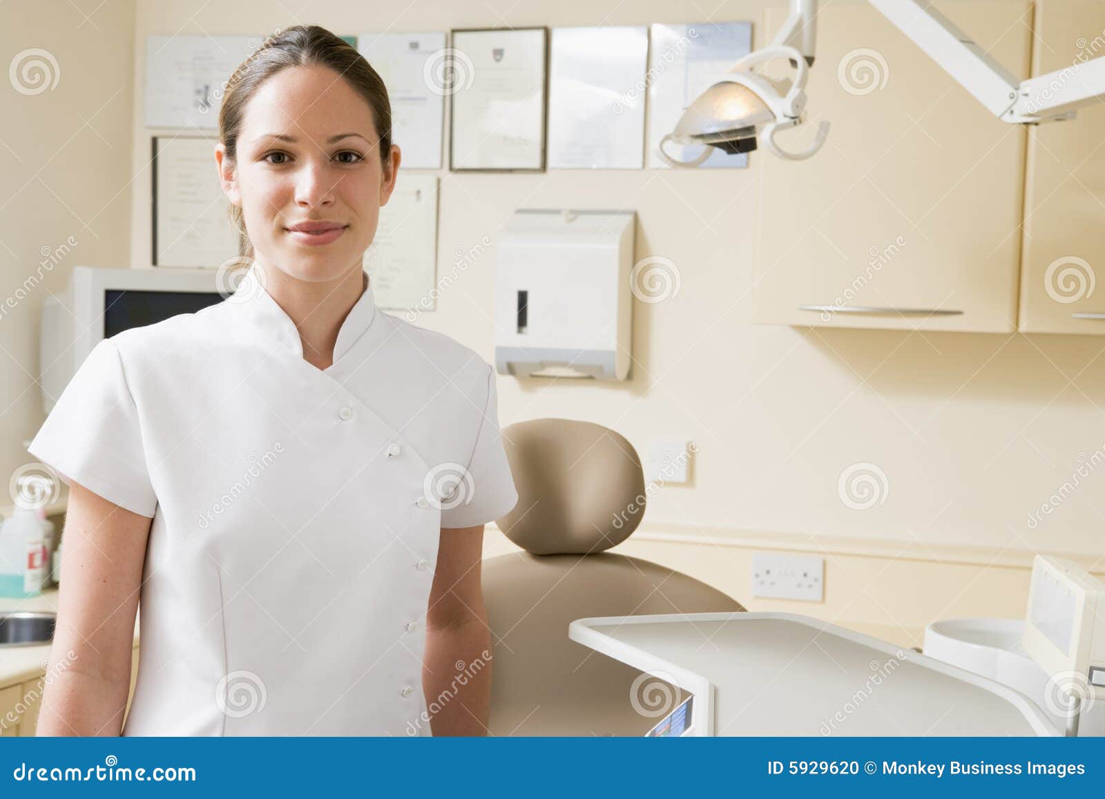 Dental Assistant in Exam Room Smiling Stock Photo - Image of dentistry ...