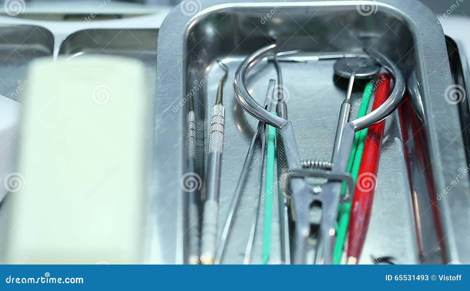 Dental Assistant Lays Out Tools on Tray for Dentist To Use during ...