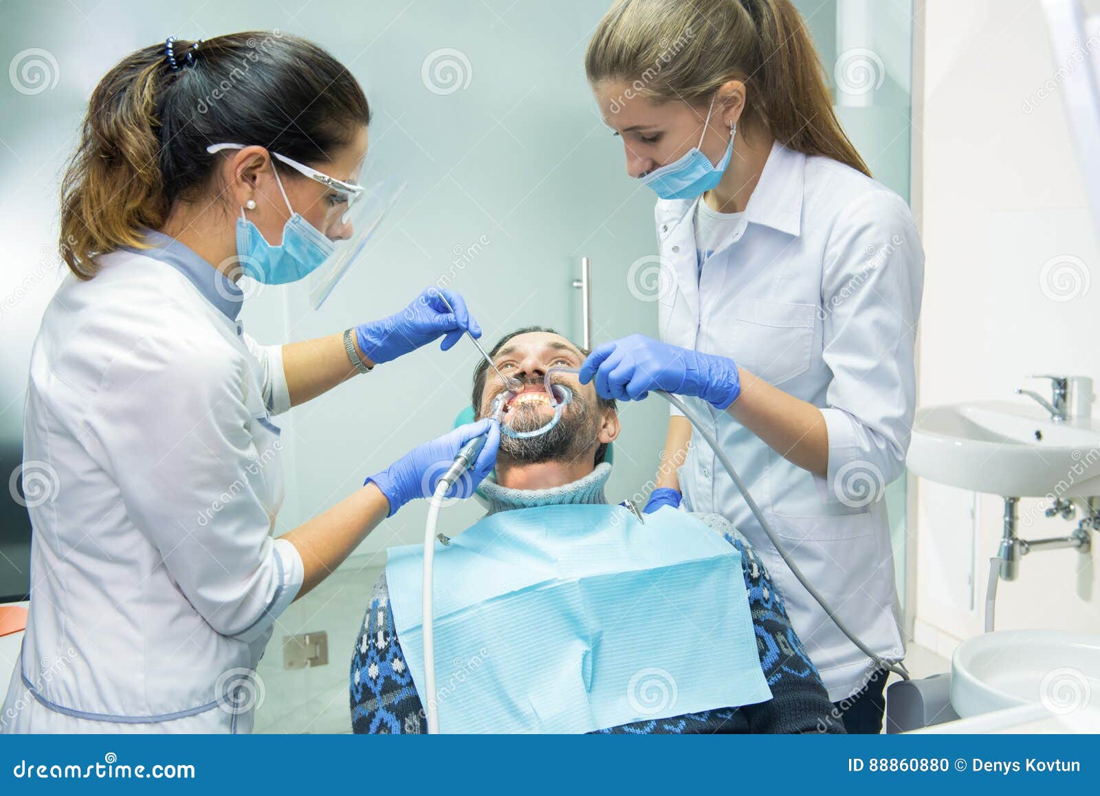 Dental Doctors with Patient. Stock Photo - Image of healthcare, adult ...