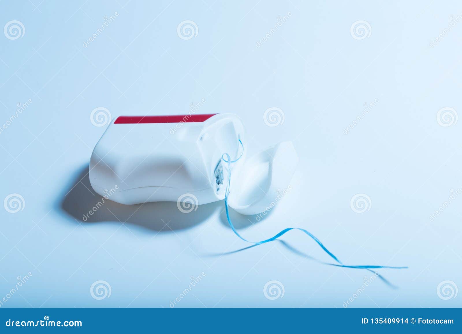 Dental Floss on an Blue Background Stock Photo - Image of blue ...