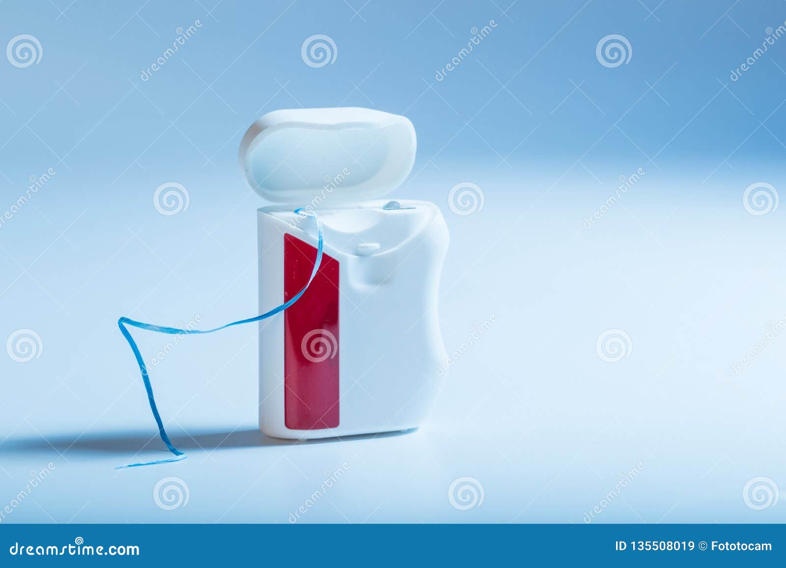 Dental Floss on an Blue Background Stock Image - Image of bathroom ...
