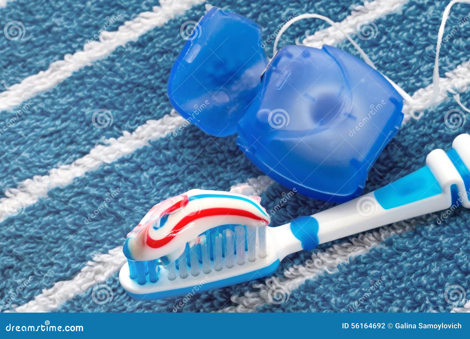 Dental Floss and a Blue Toothbrush Stock Photo - Image of background ...