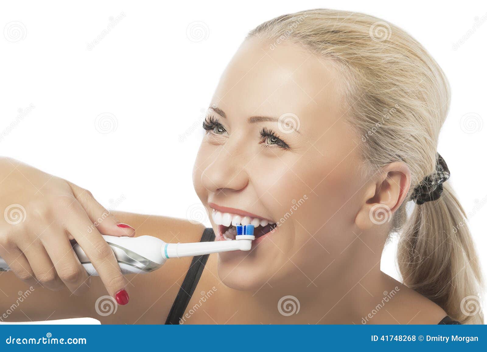 Dental Health Caucasian Blond Woman Brushing Her Teeth By Using Stock