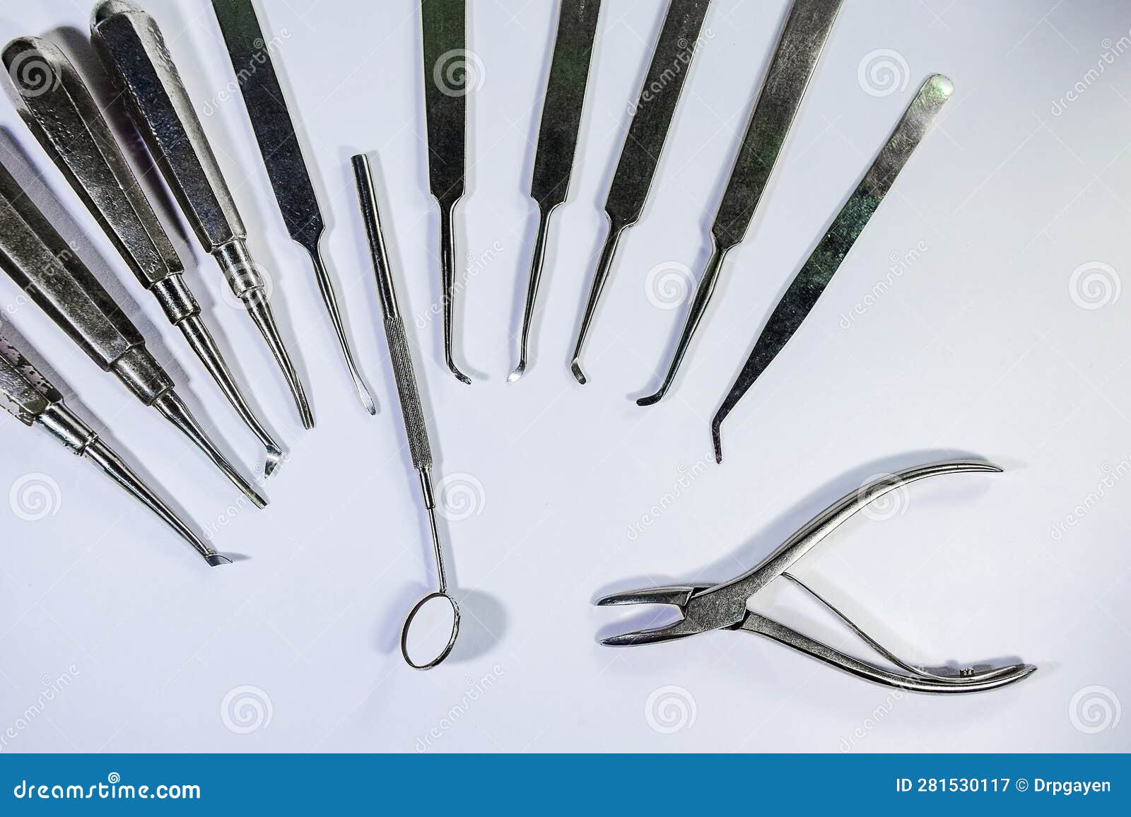 Dental Instruments Arranged on White Table Stock Image - Image of ...