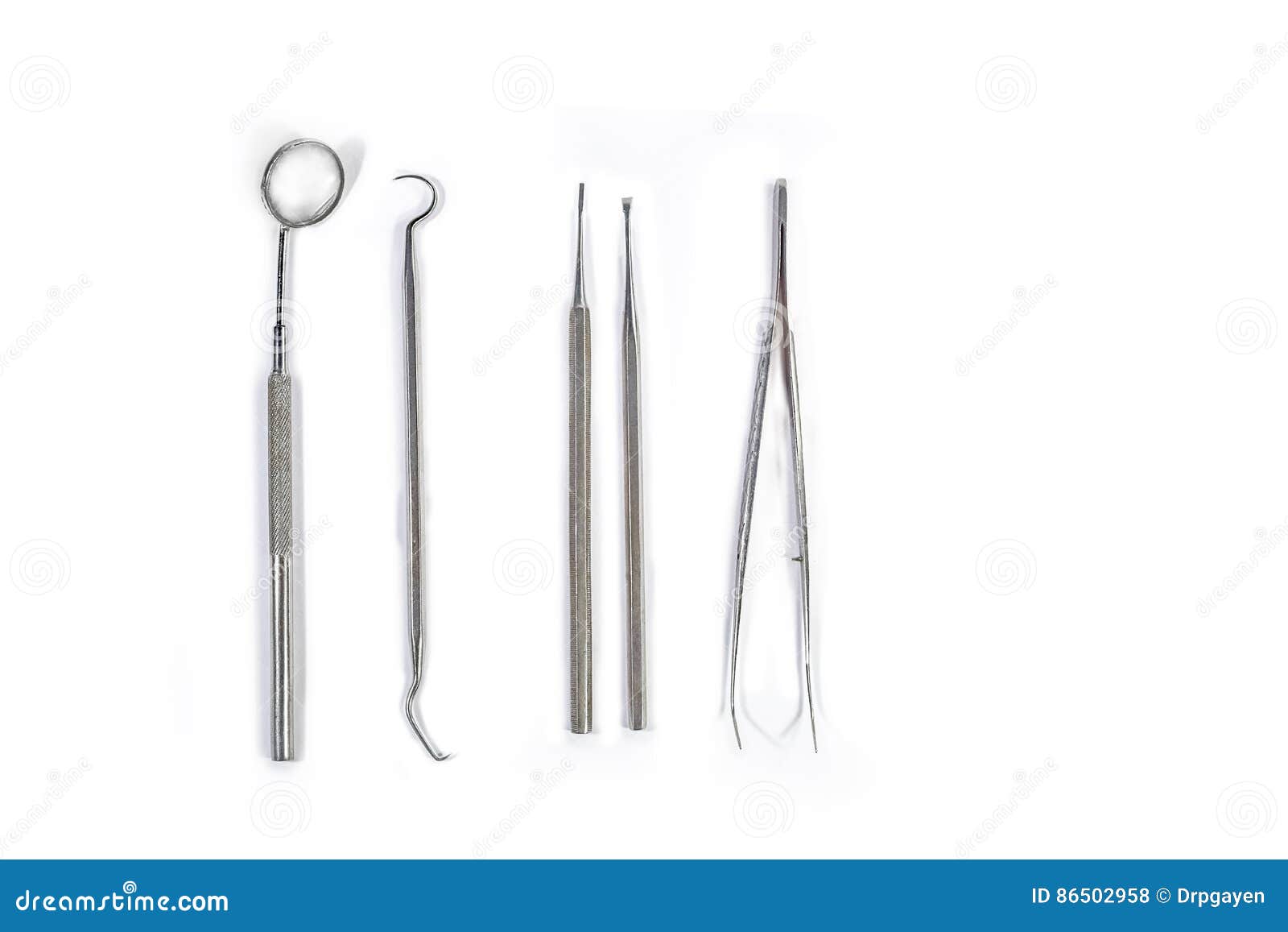 Dental Instruments Arranged on White Table. Stock Photo - Image of ...