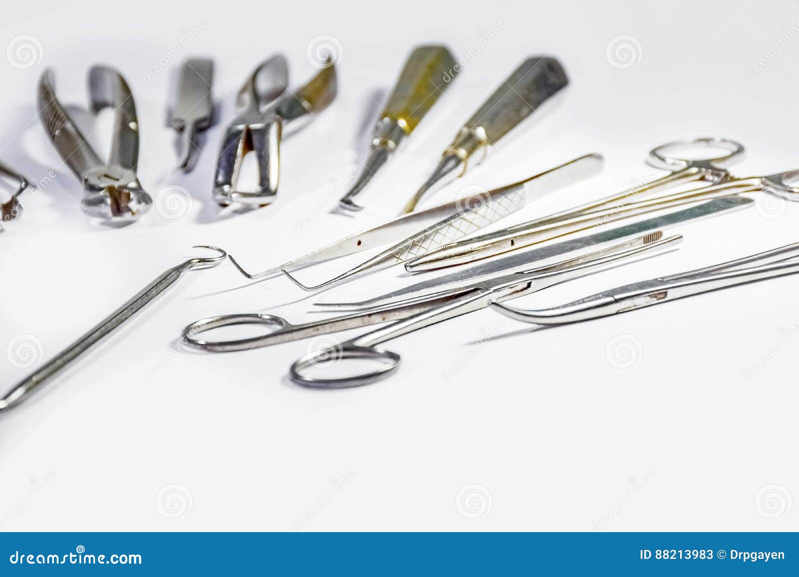 Dental Instruments Arranged on White Table. Stock Image - Image of ...