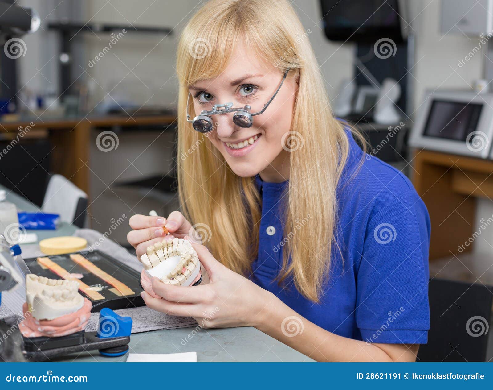Dental Lab Technician Applying Porcelain To Dentition Mold Stock Image ...