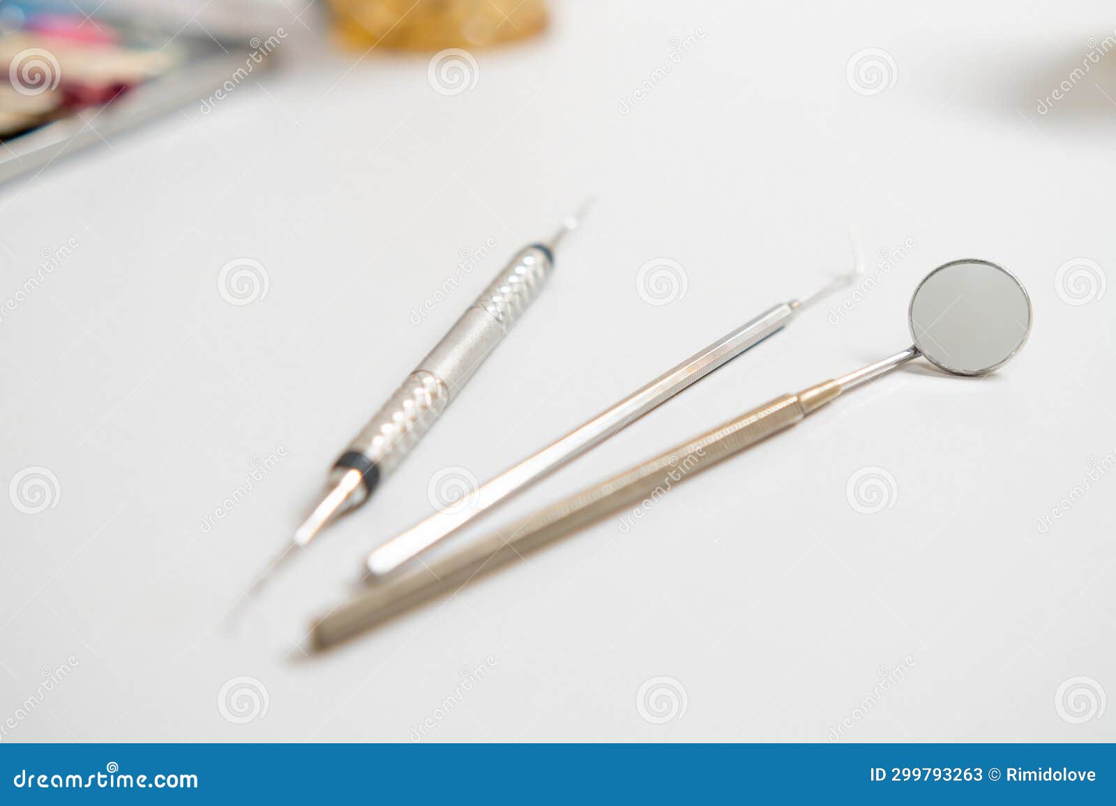 Dental Mirror, Explorer, Hook, and Dental Tools on the Table in ...