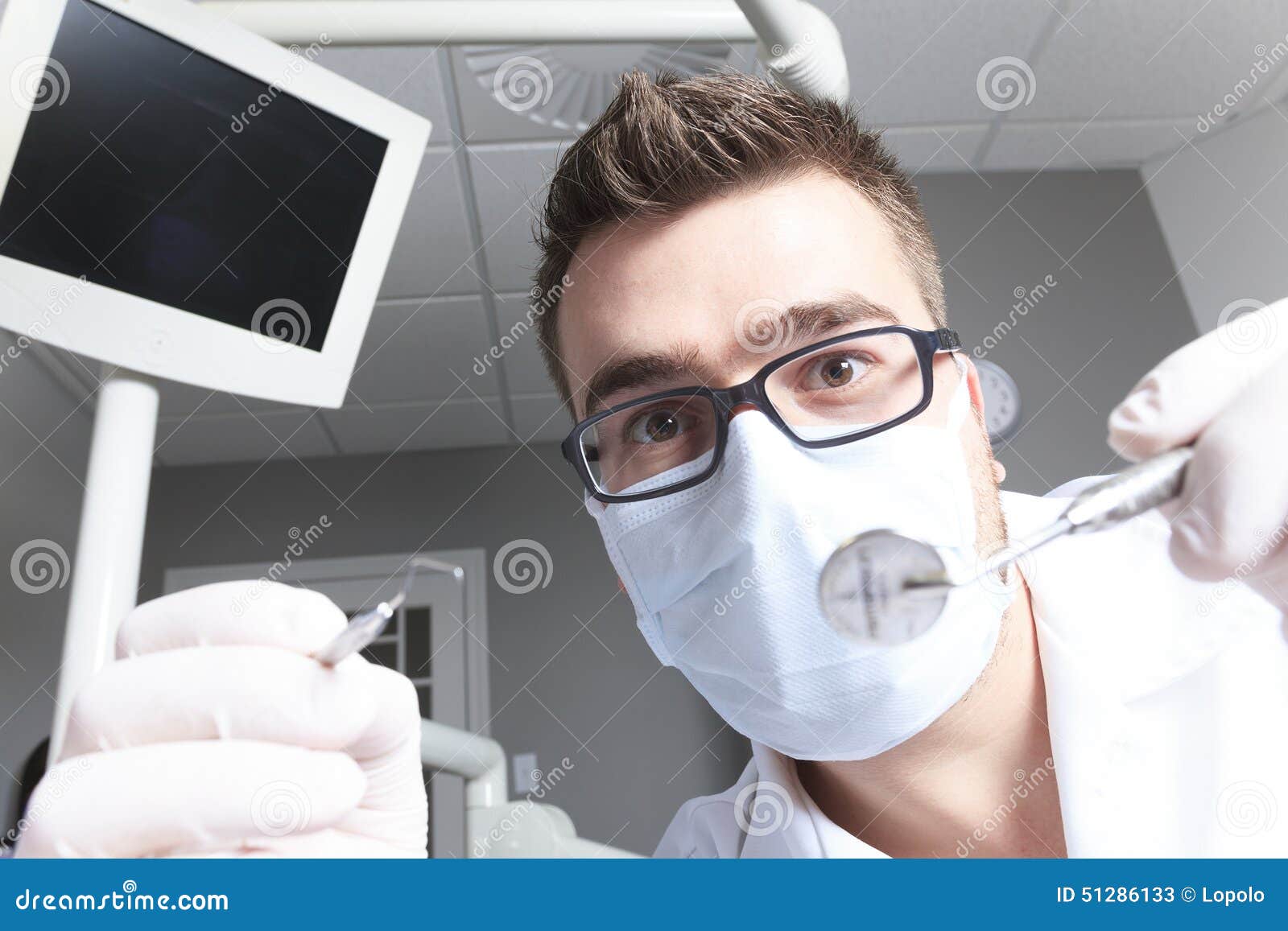 Close Up Of Dentist Putting Intraoral Shield To Children Patient Mouth ...
