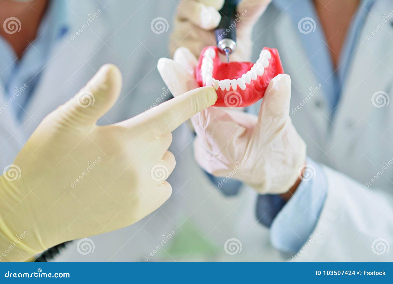 Dental Prosthesis, Dentures, Prosthetics Work. Prosthetics Hands while ...