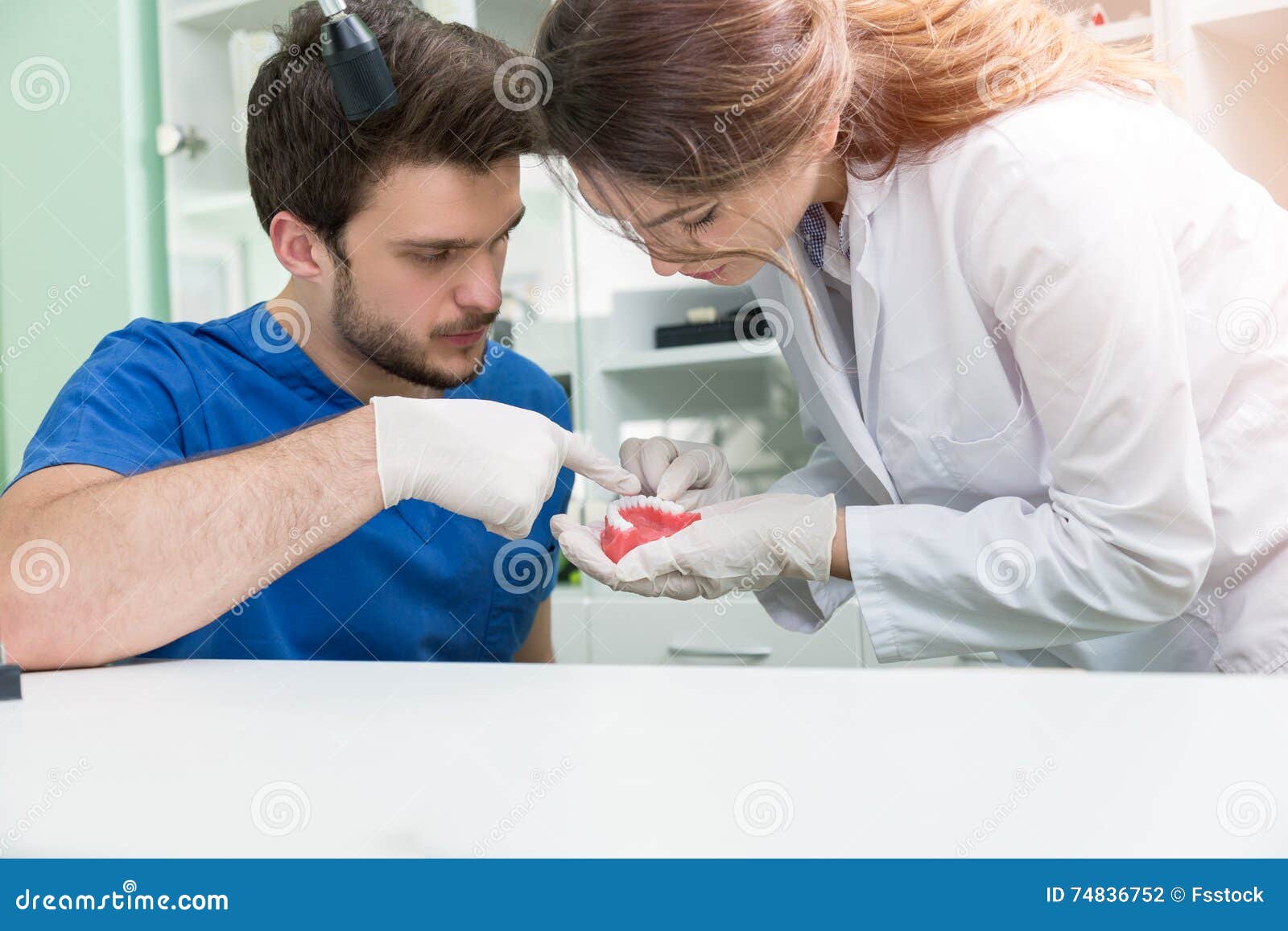 Dental Prosthesis, Dentures, Prosthetics Work. Prosthetics Hands while ...