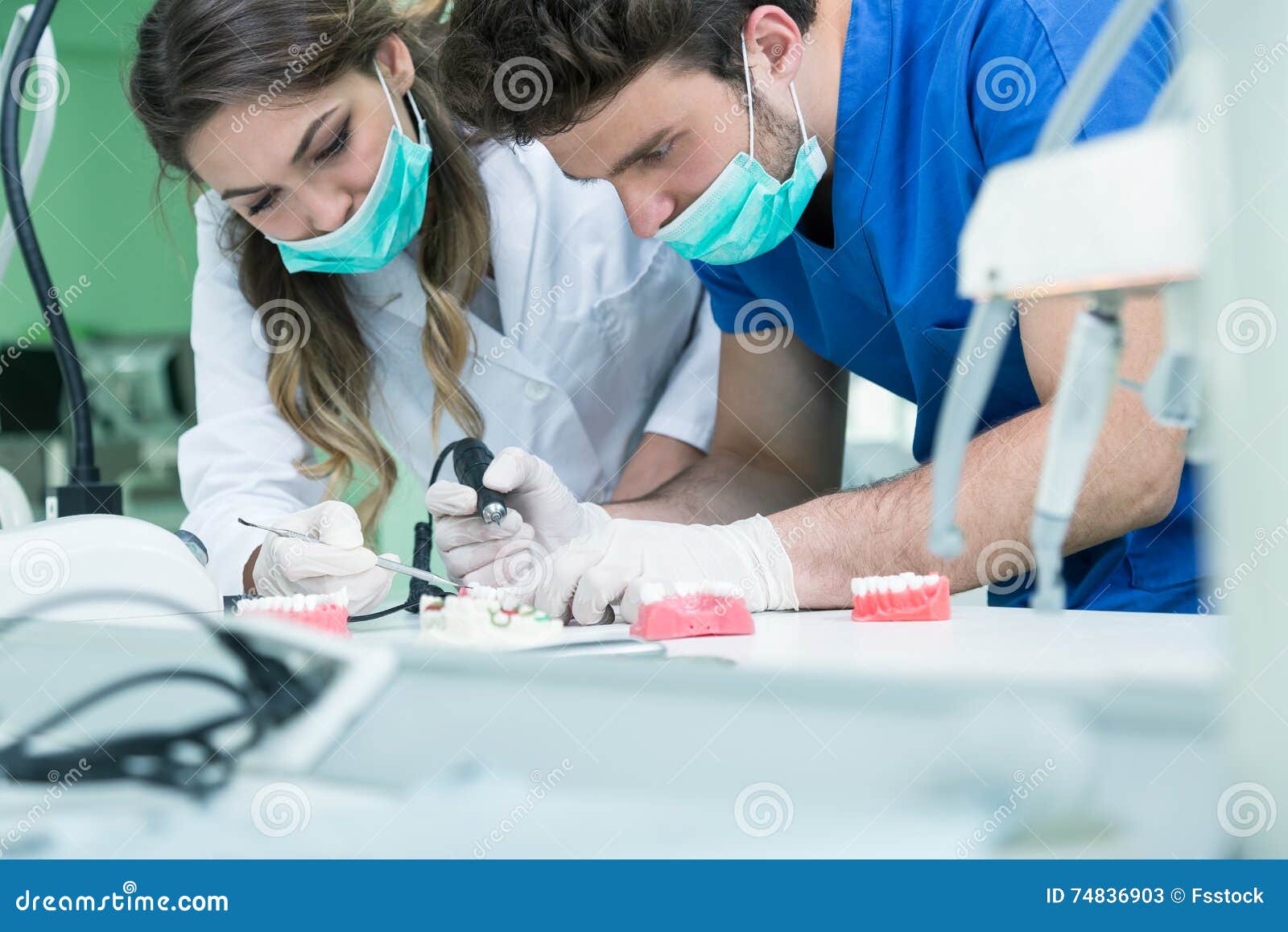 Dental Prosthesis, Dentures, Prosthetics Work. Prosthetics Hands while ...