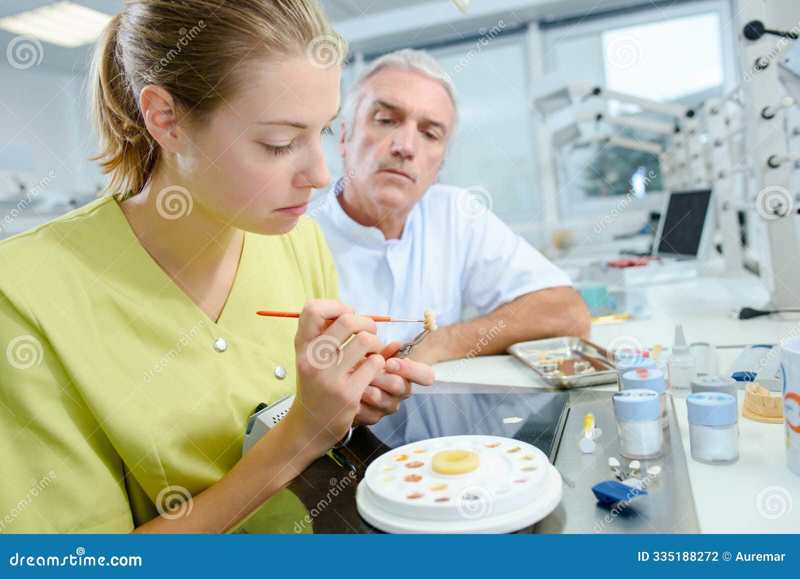 Dental Technician Being Supervised while Working at Prosthesis ...