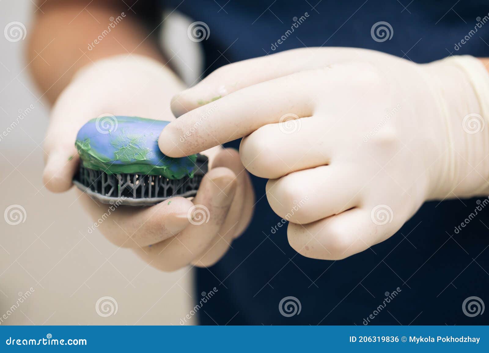 Dental Technician Making of Denture in a Dental Lab. Making a Template ...