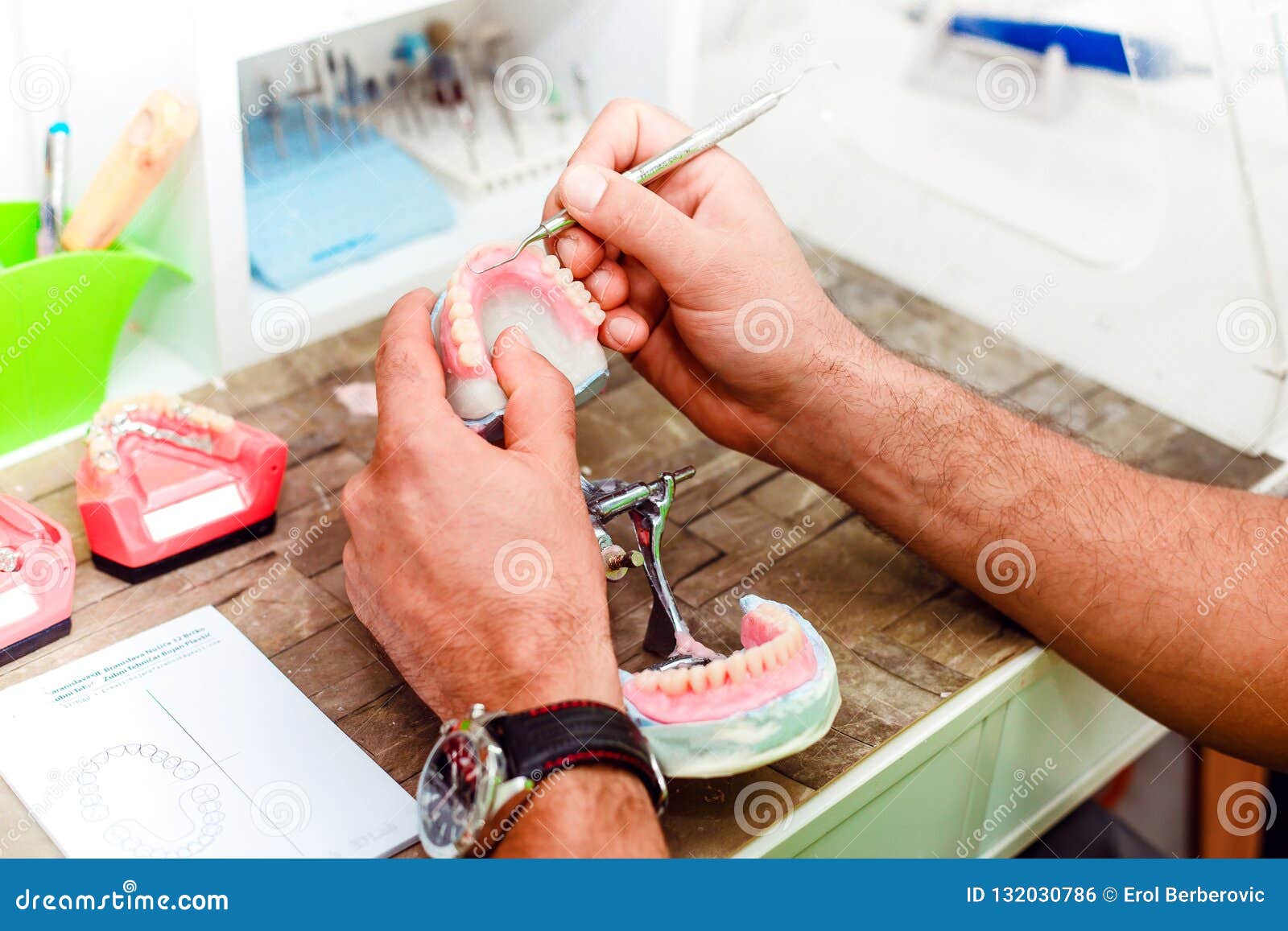 Dental Technician Working with Artificial Implants Stock Photo - Image ...