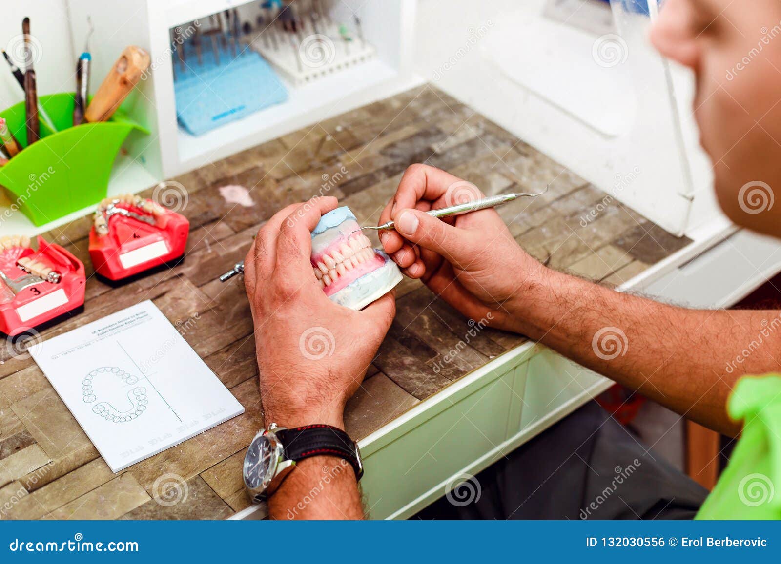 Dental Technician Working with Artificial Implants Stock Photo - Image ...
