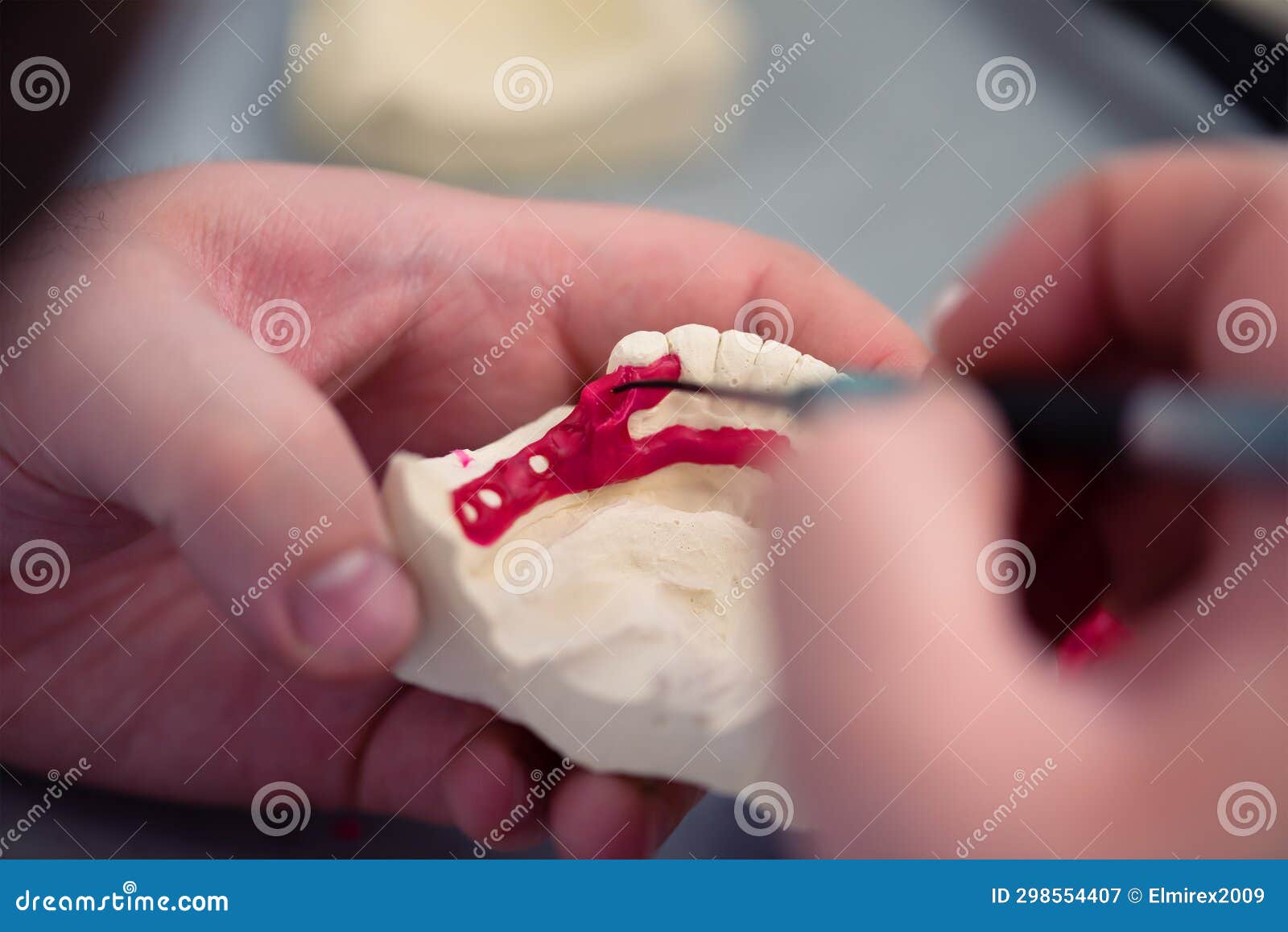 Dental Technician Working with Tooth Denture at Prosthesis Laboratory ...