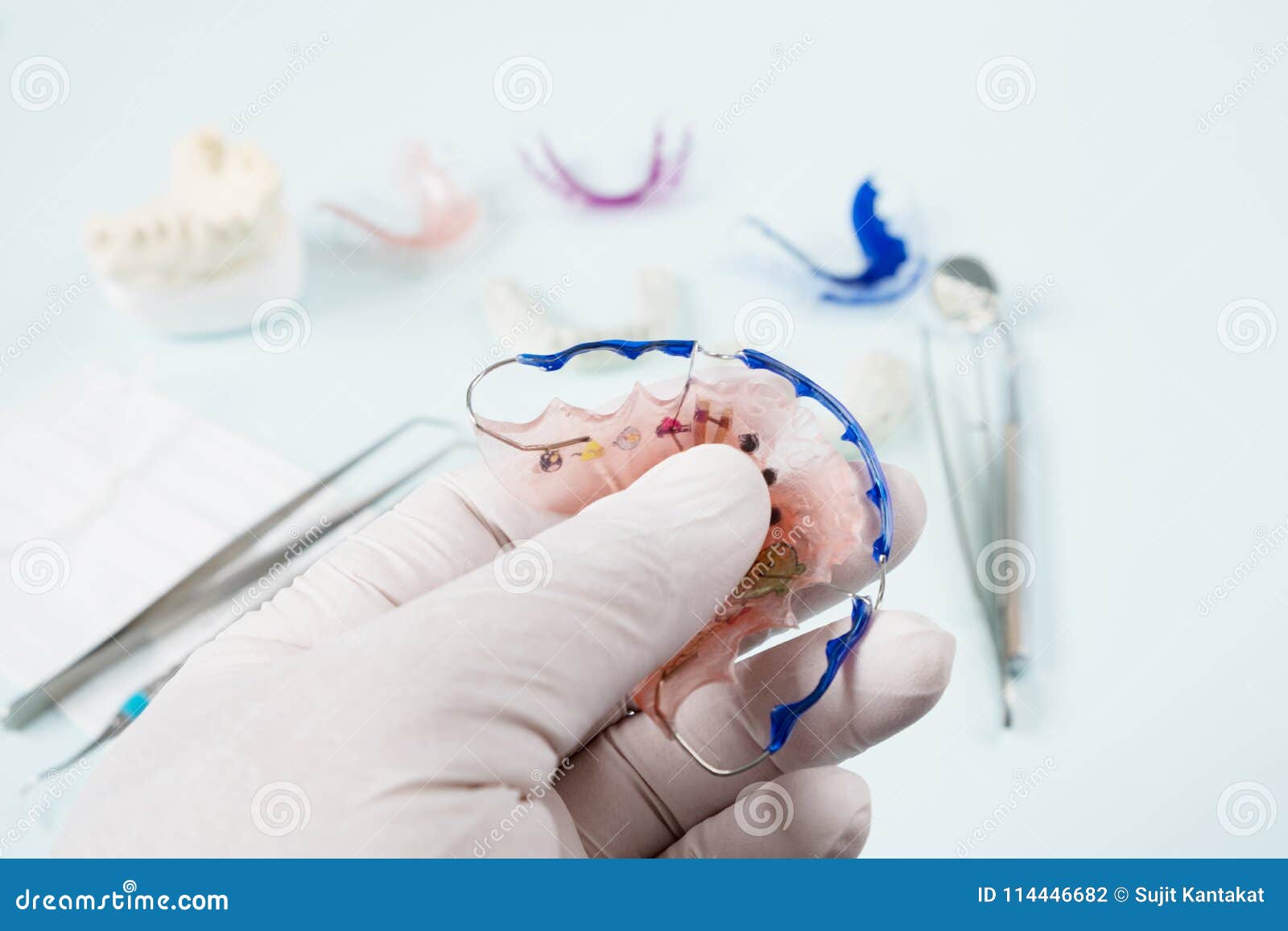 Dental tools and retainer. stock photo. Image of appliance - 114446682