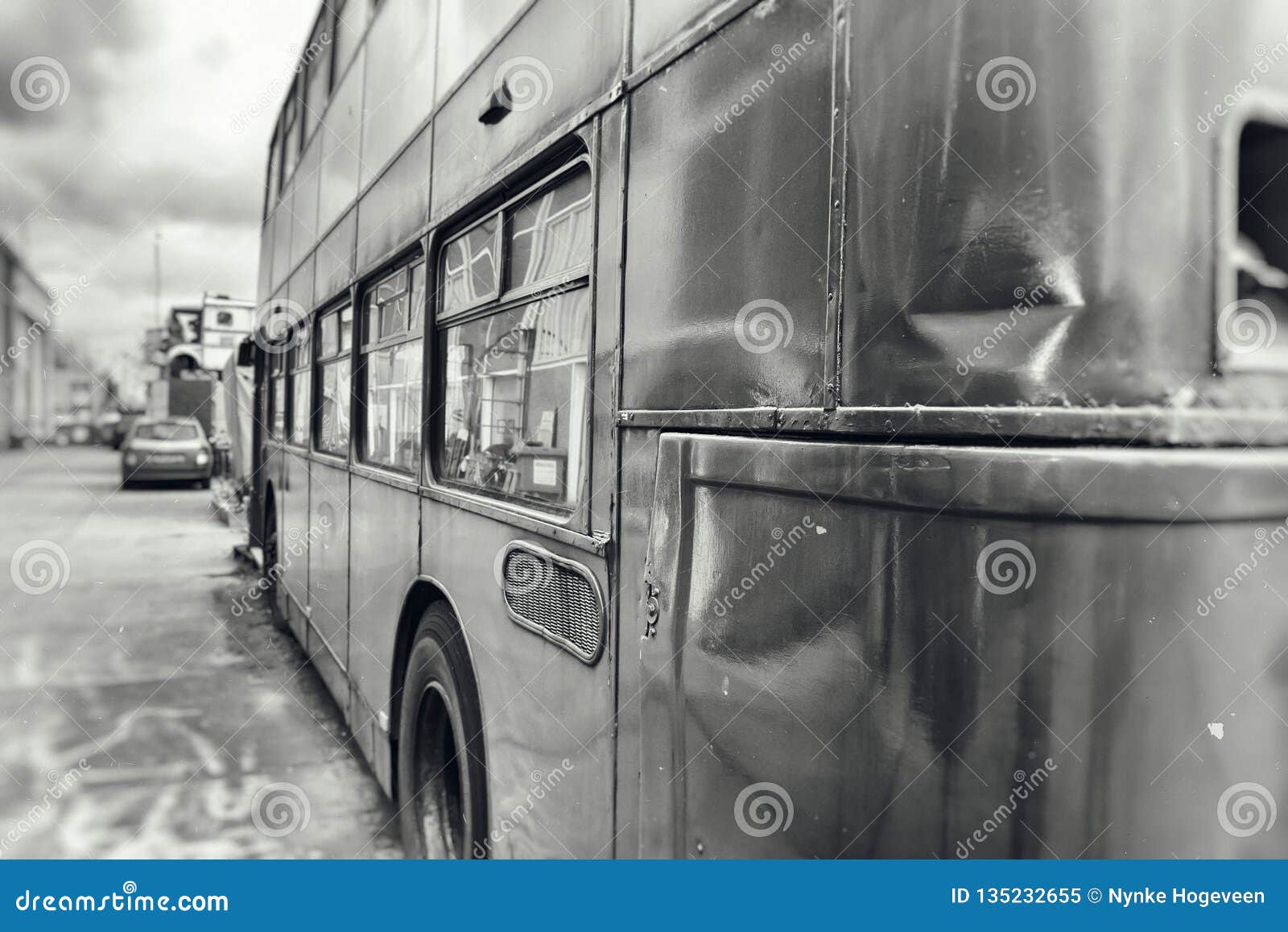 Dented double decker bus stock image. Image of white - 135232655