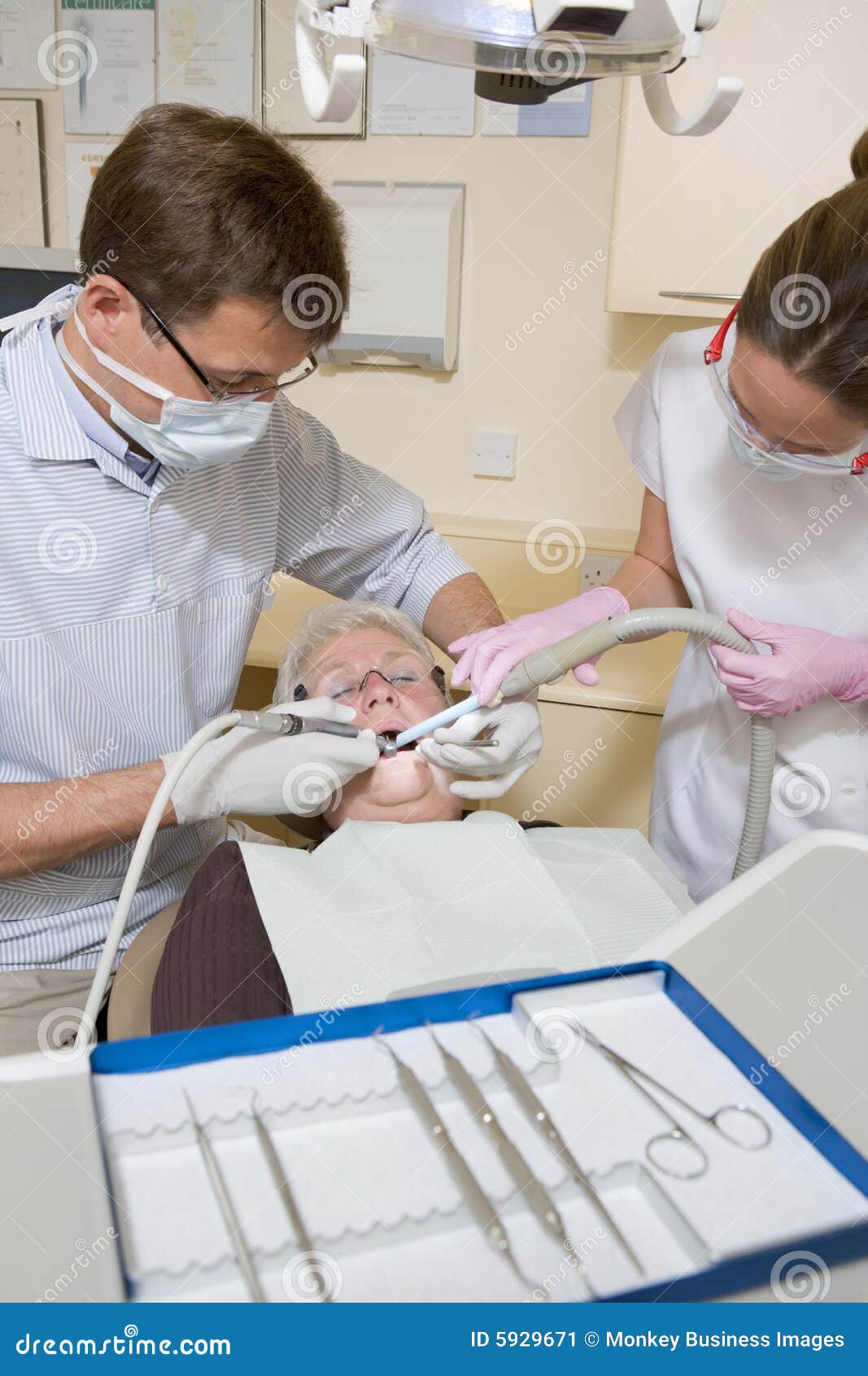 The Dentist`s Assistant Insert The Packaged Dental Instrument To The ...