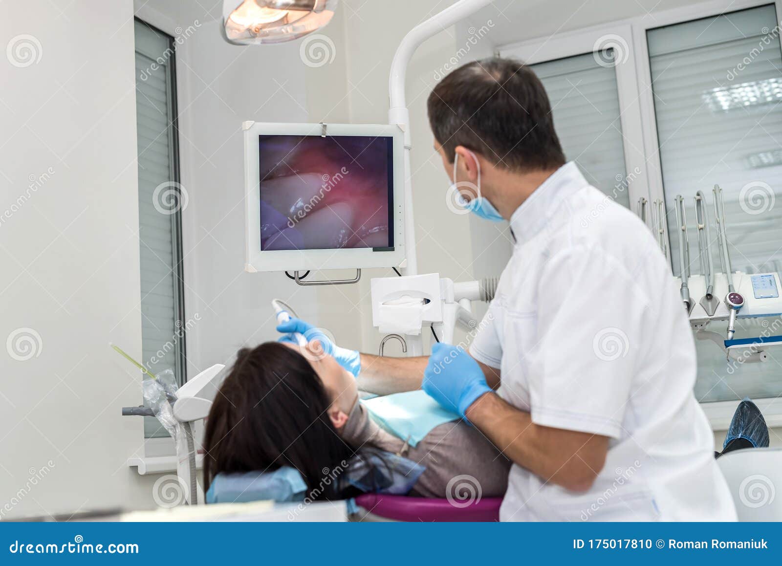 Dentist Checking Patient`s Teeth with Camera, Looking on Screen Stock ...