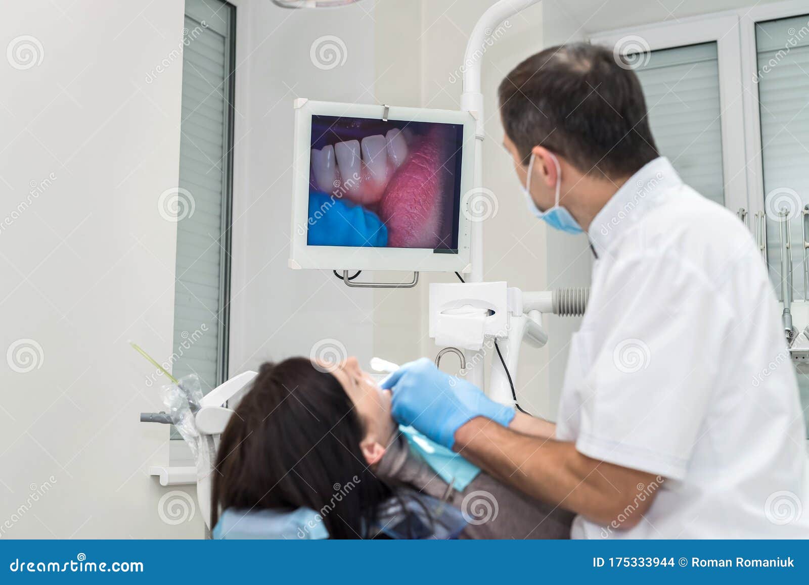 Dentist Checking Patient`s Teeth with Camera, Looking on Screen Stock ...