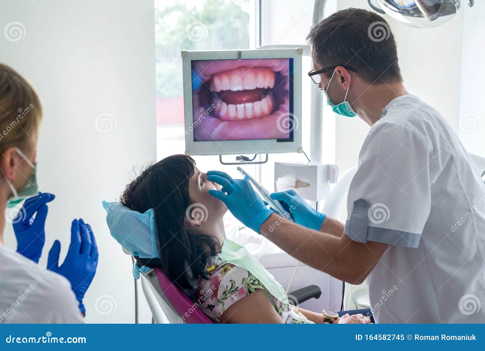 Dentist Checking Patient`s Teeth with Intraoral Camera Stock Image ...