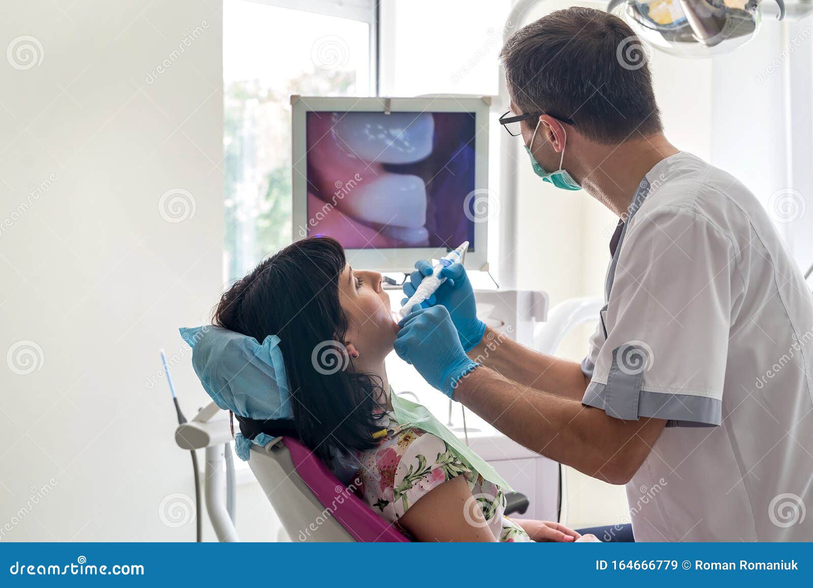 Dentist Checking Patient`s Teeth with Intraoral Camera Stock Image ...