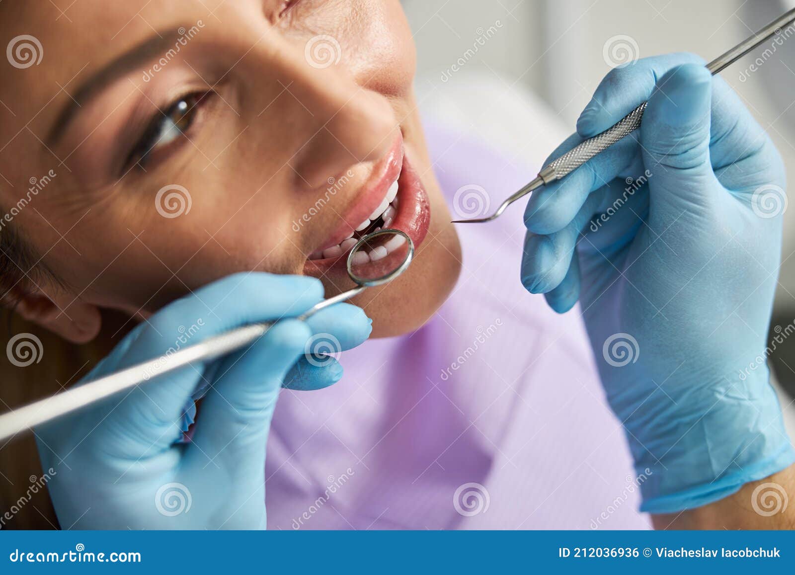 Dentist Checking Upper Teeth with a Dental Mirror Stock Photo - Image ...