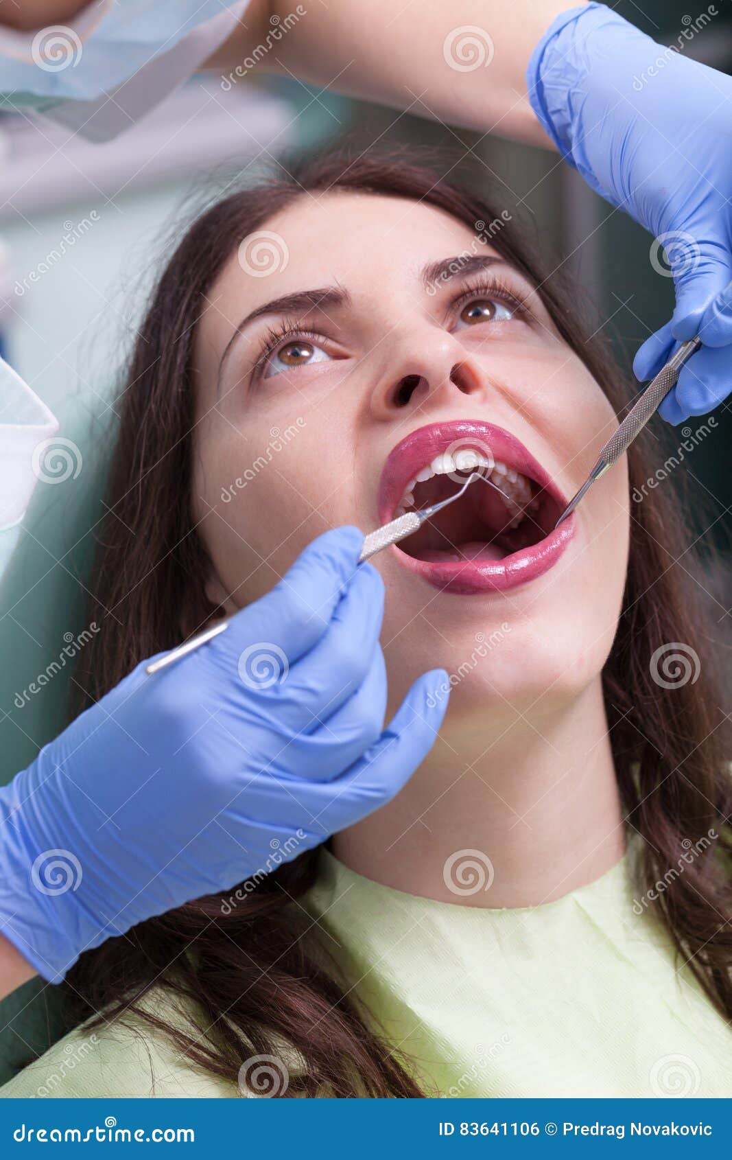 Dentist Curing a Female Patient Stock Photo - Image of girl, clinic ...