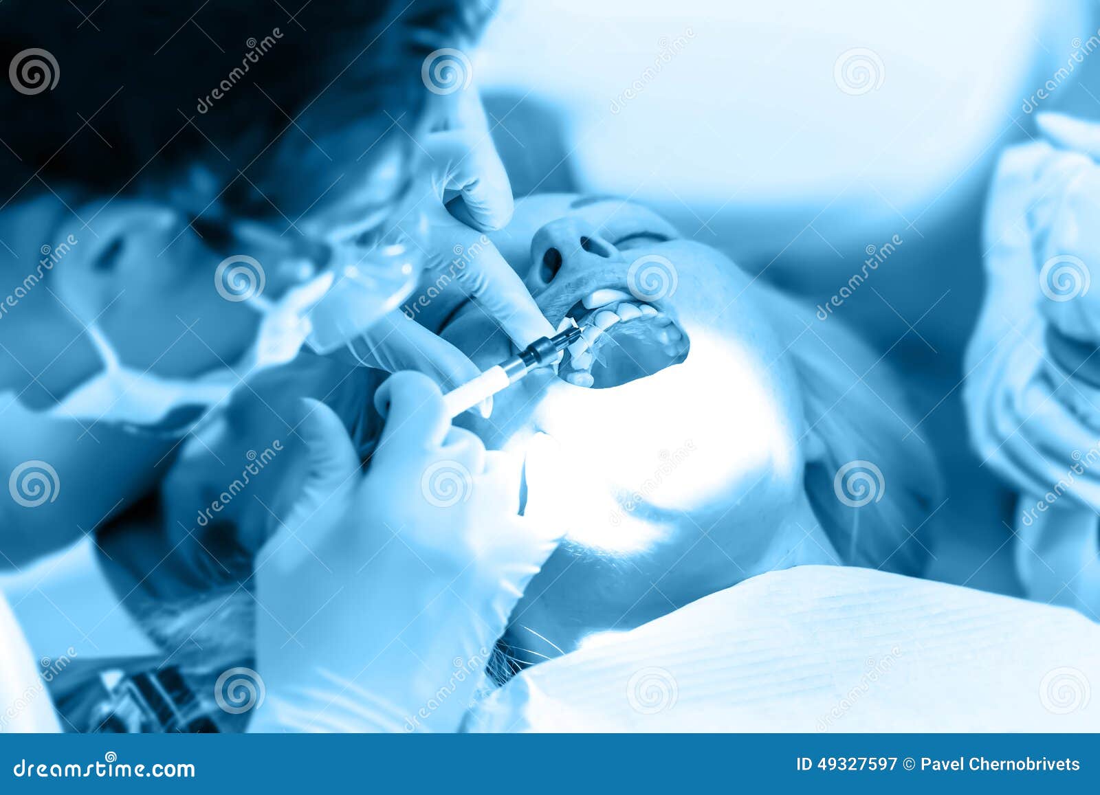 Dentist Curing a Female Patient Stock Image - Image of adult ...
