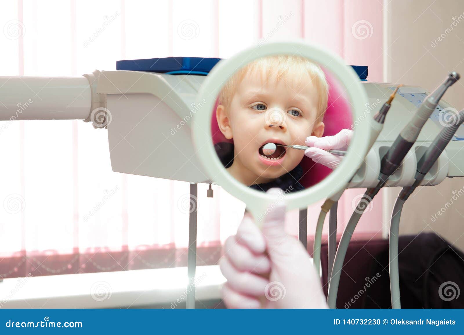 Dentist Doing Regular Dental Check-up To Little Boy. Stock Photo ...