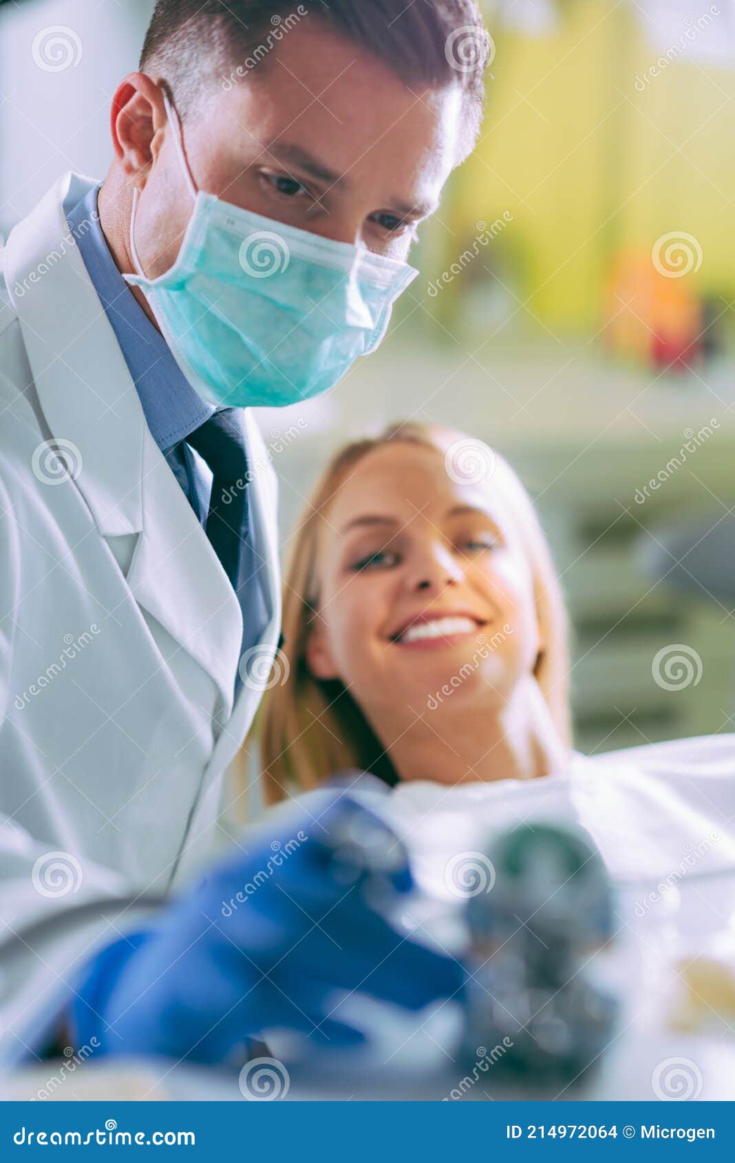 Dentist drilling teeth stock photo. Image of esthethic - 214972064