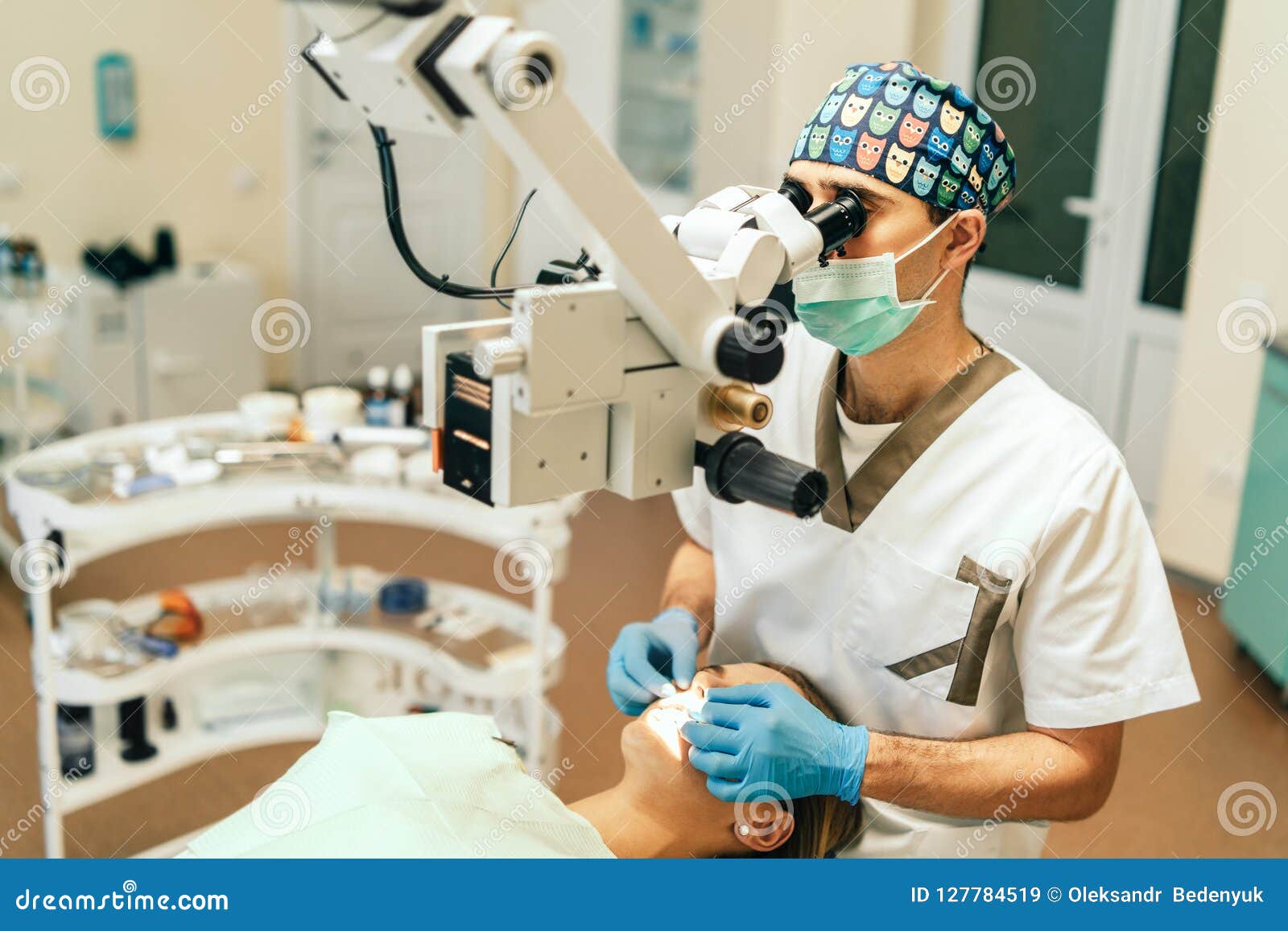Dentist Examine Oral Cavity of Female Patient with Microscope. Stock ...