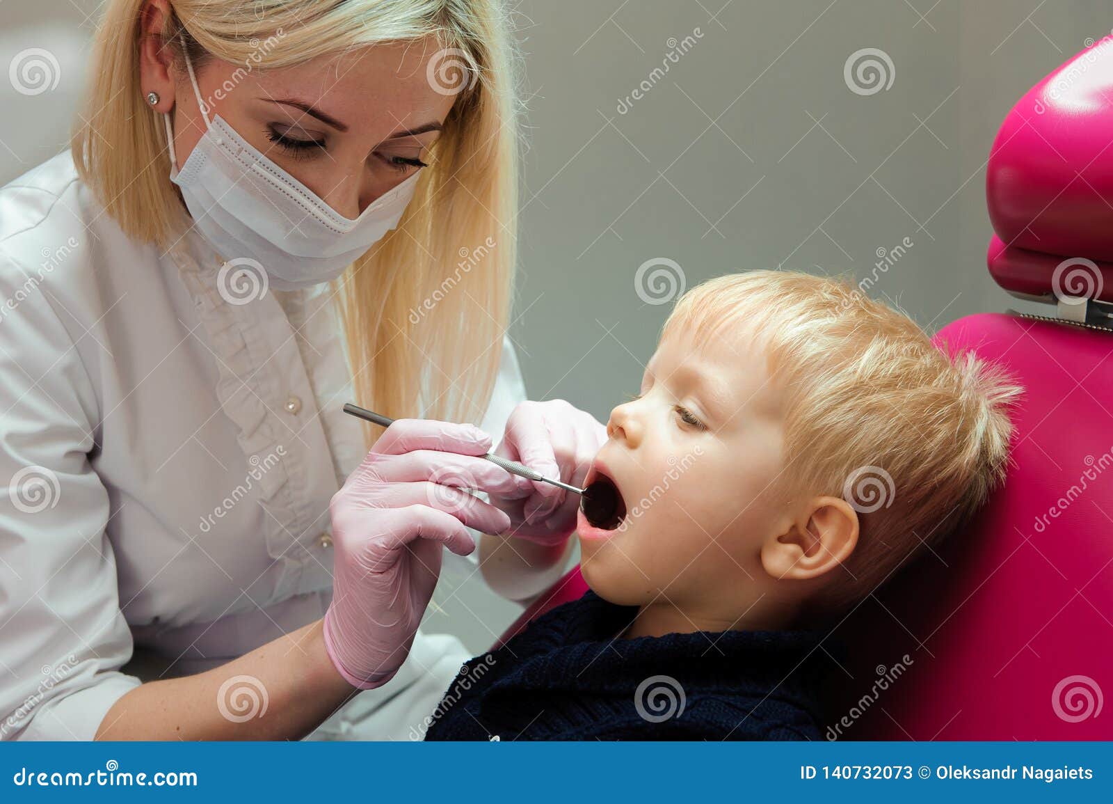 Dentist Examining Kid`s Teeth at Dental Clinic Stock Image - Image of ...