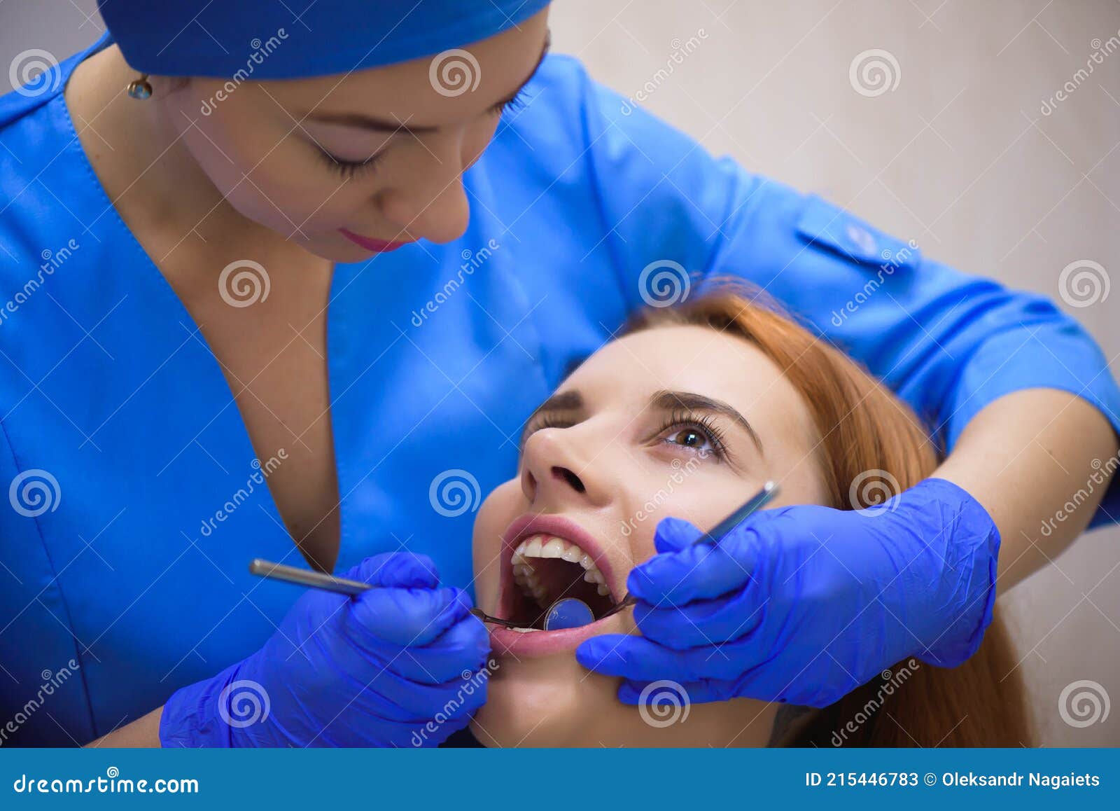 Dentist Examining a Patient S Teeth in the Dentist. Stock Image - Image ...