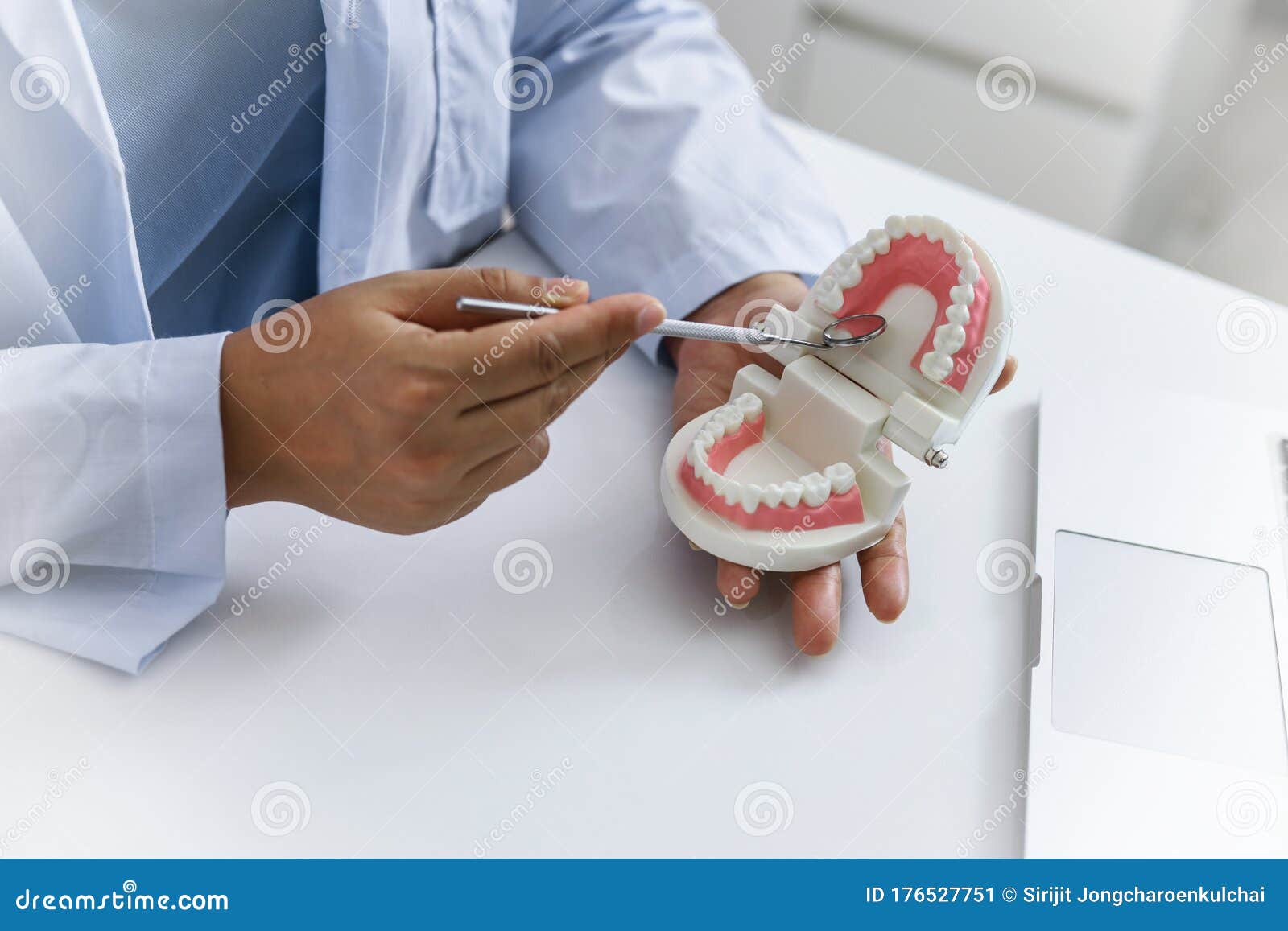 Dentist Examining a Patient Teeth Medical Treatment at the Dental ... Dentist Examining a Patient Teeth Medical Treatment at the Dental ...