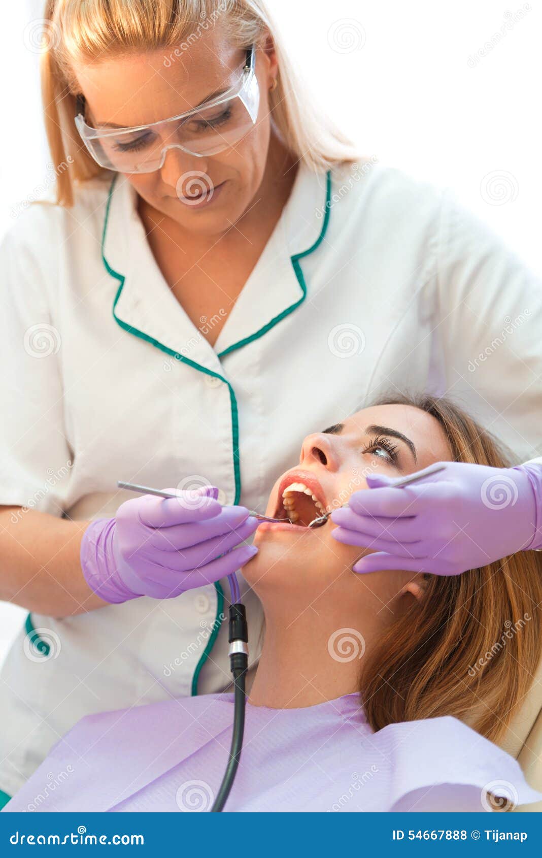 Dentist Examining Teeth at Dental Office Stock Photo - Image of bright ...