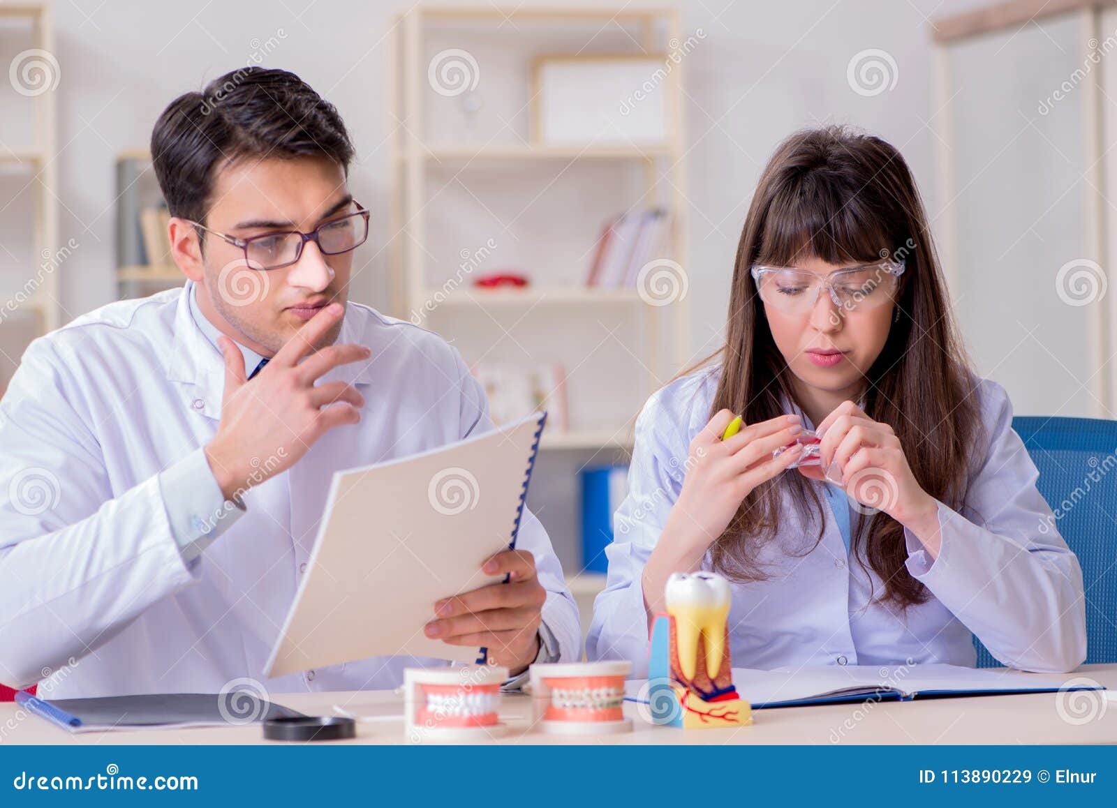 The Dentist Explaining Student Tooth Structure Stock Image - Image of ...