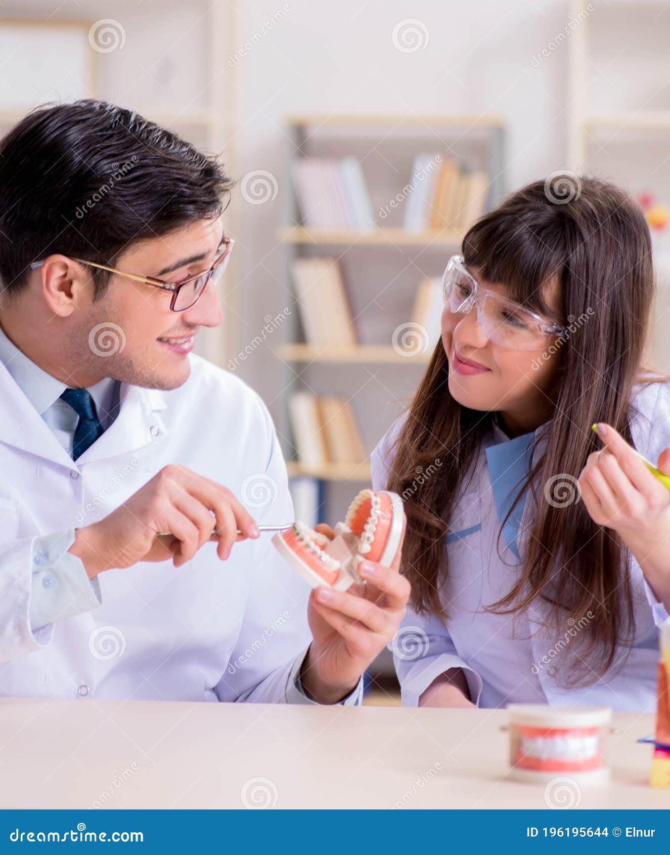 Dentist Explaining Student Tooth Structure Stock Photo - Image of ...